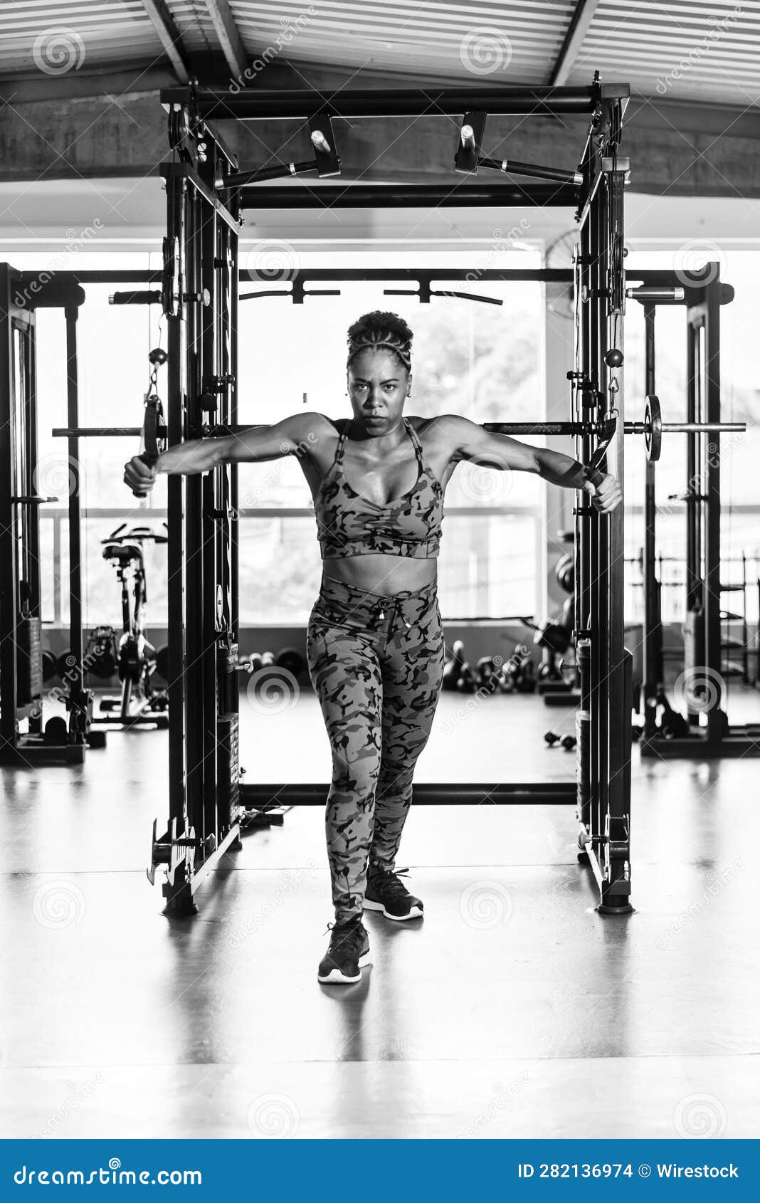 Young Woman is Doing a Cable Cross-over Exercise at a Gym Stock Photo - Image of aerobic, cable ...