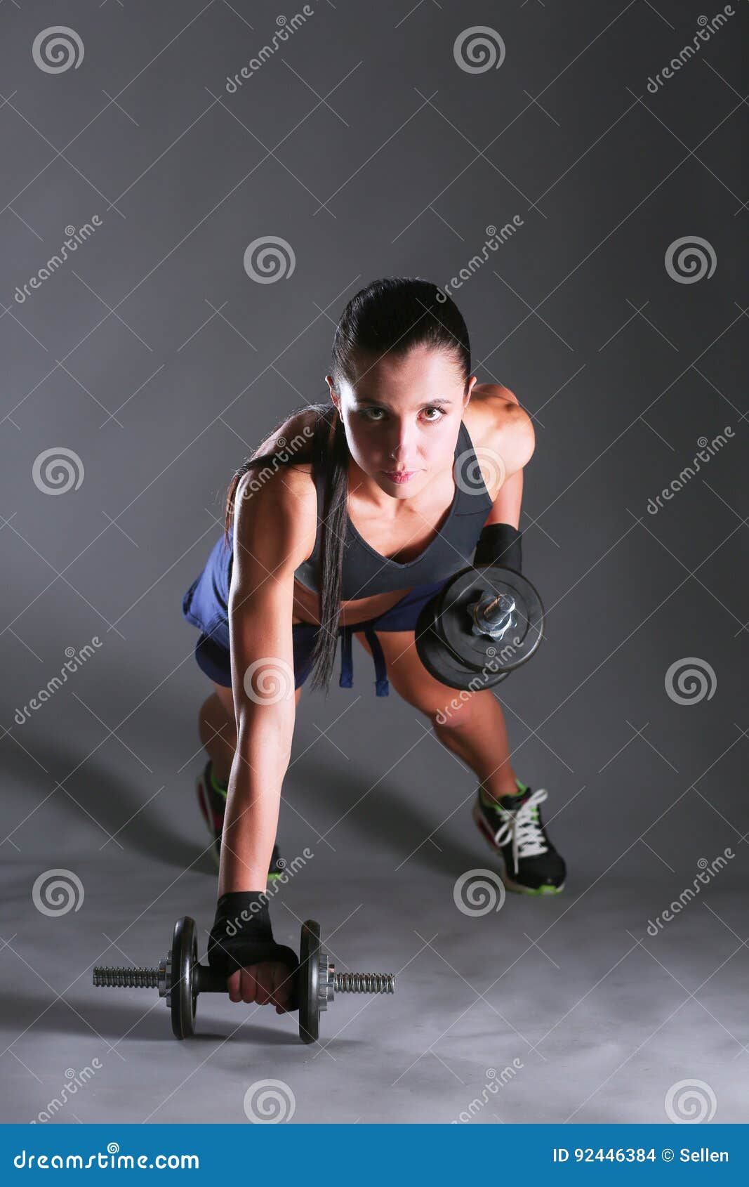 Young Woman Doing Exercise with Dumbbells Stock Photo - Image of female ...