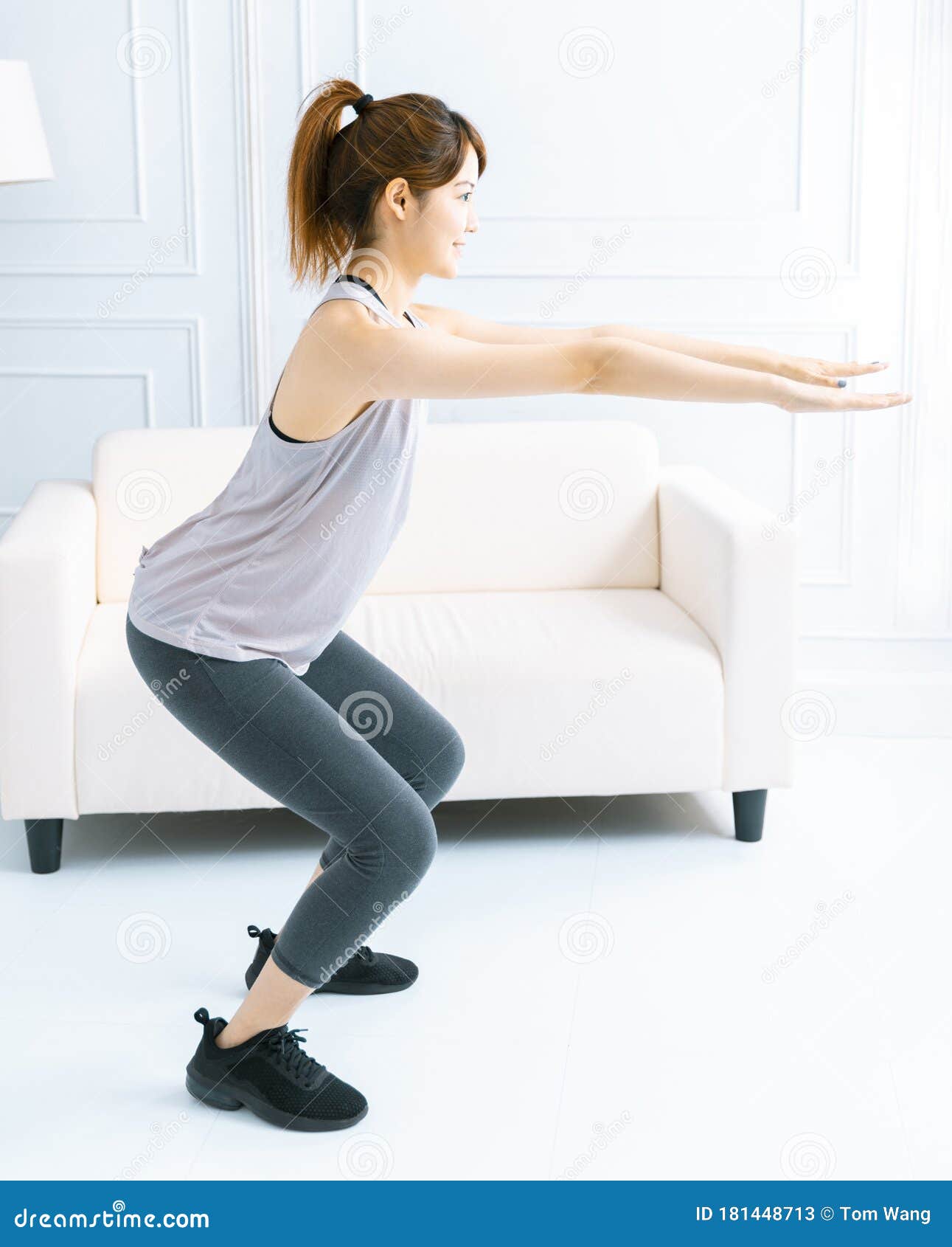 Young Woman Doing Exercise at Home in the Living Room Stock Image ...