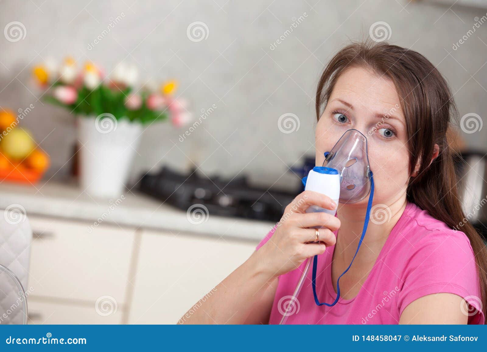 Young Woman Doing Inhalation with a Nebulizer at Home Stock Image ...