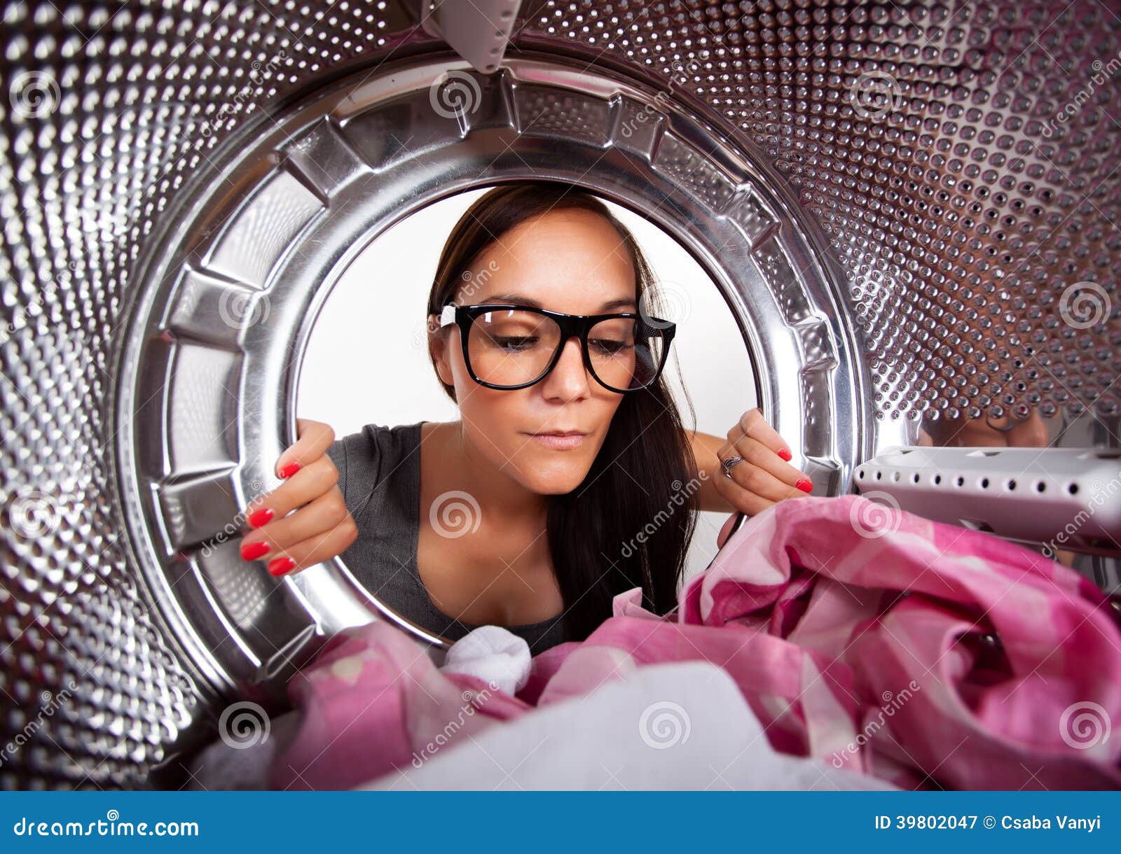 Young woman doing laundry stock image. Image of thirties - 39802047