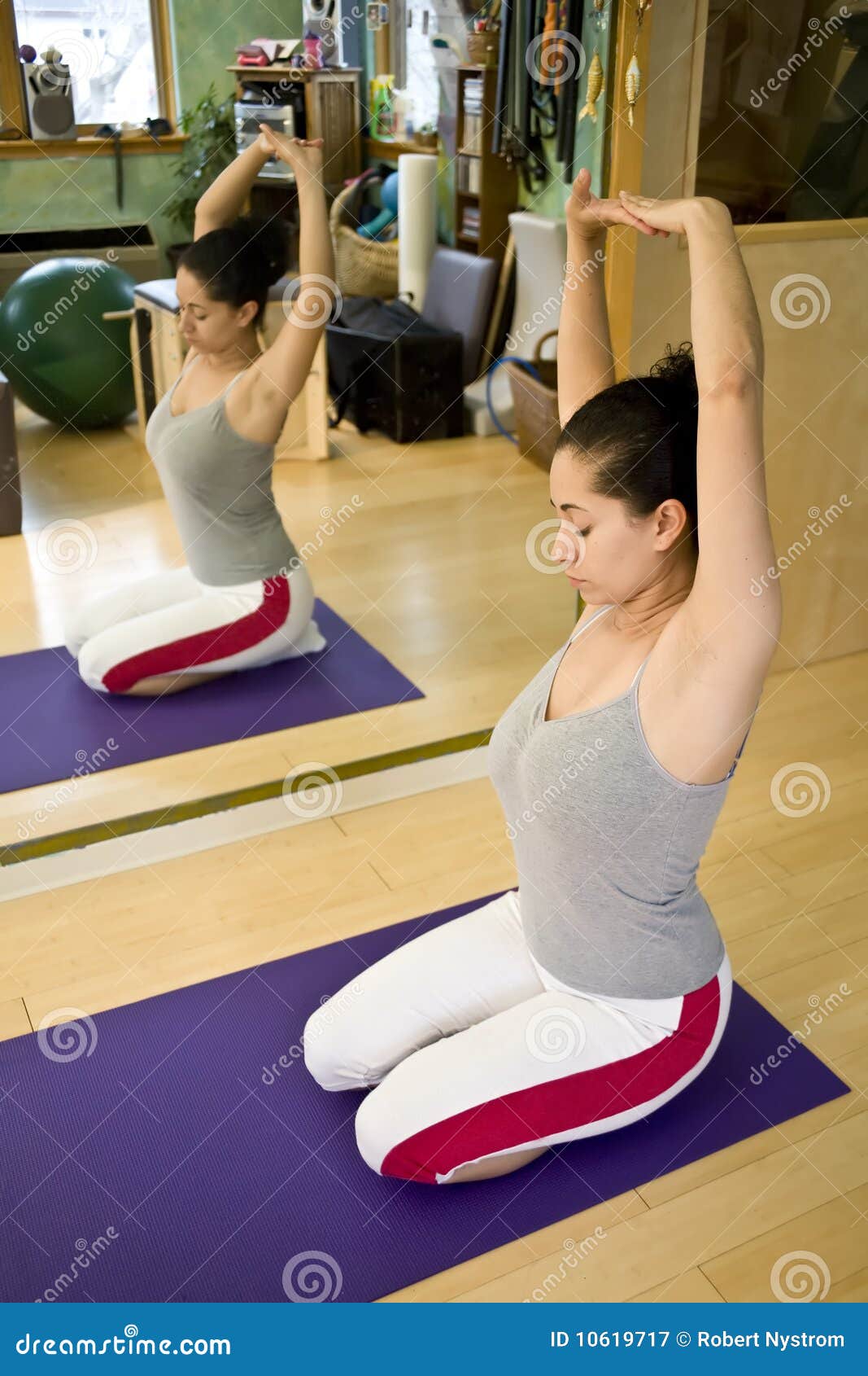 Young woman doing Pilates stock image. Image of machine - 10619717