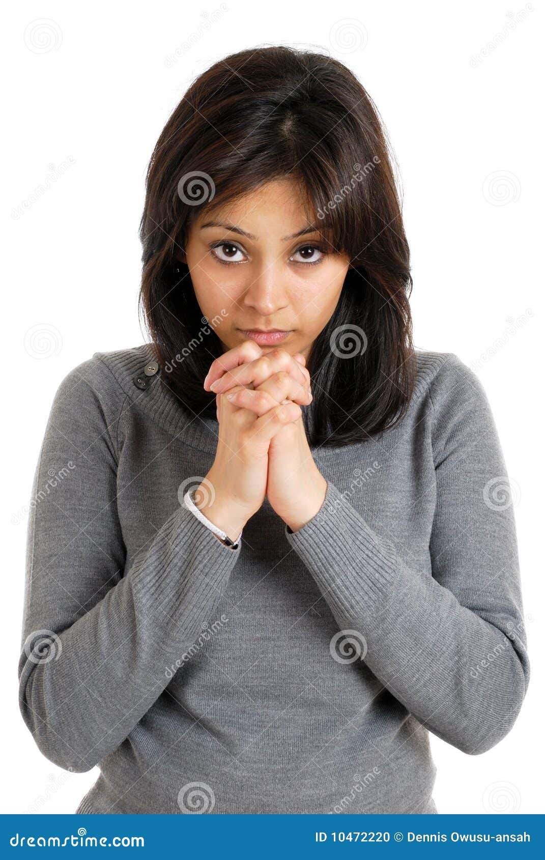 Young Woman Doing Prayer Gesture Stock Photo - Image of serious ...