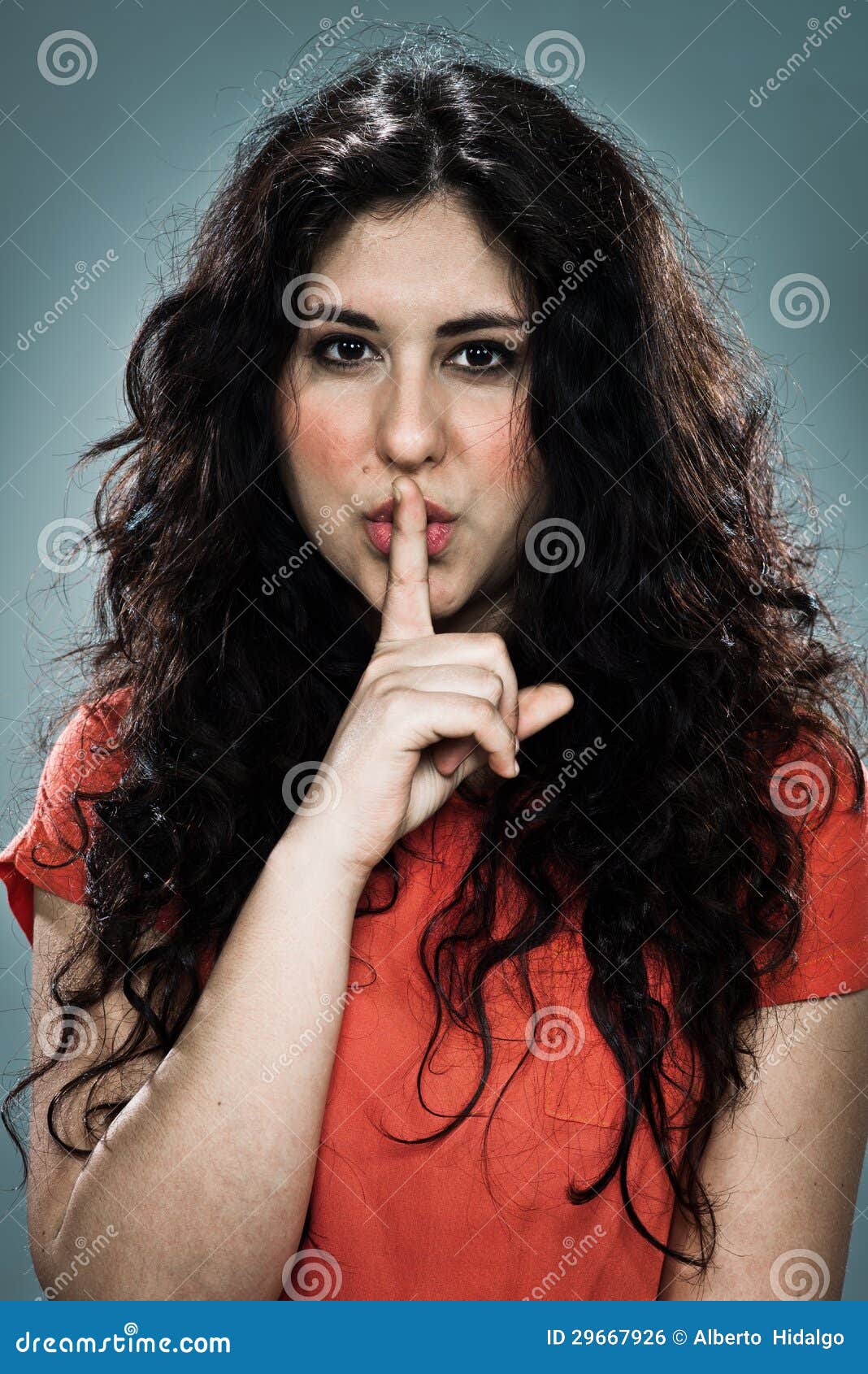 Young Woman Doing Silence Sign Stock Photo - Image of front, female ...