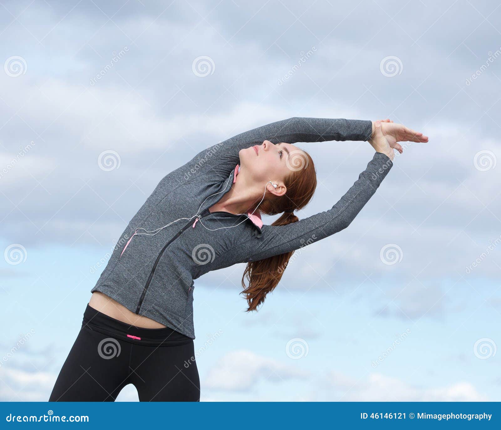 Young Woman Doing Stretch Exercises Outdoors Stock Image - Image of ...