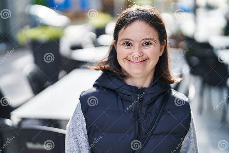 Young Woman With Down Syndrome Smiling Confident Standing At Street