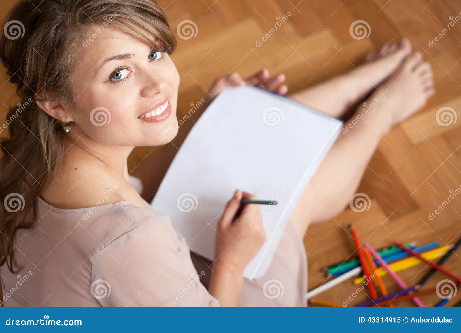 Young woman drawing stock image. Image of floor, adult - 43314915