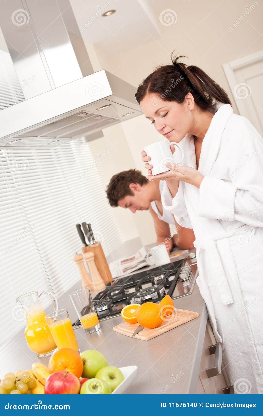 Young Woman Drinking Coffee in the Kitchen Stock Photo - Image of ...