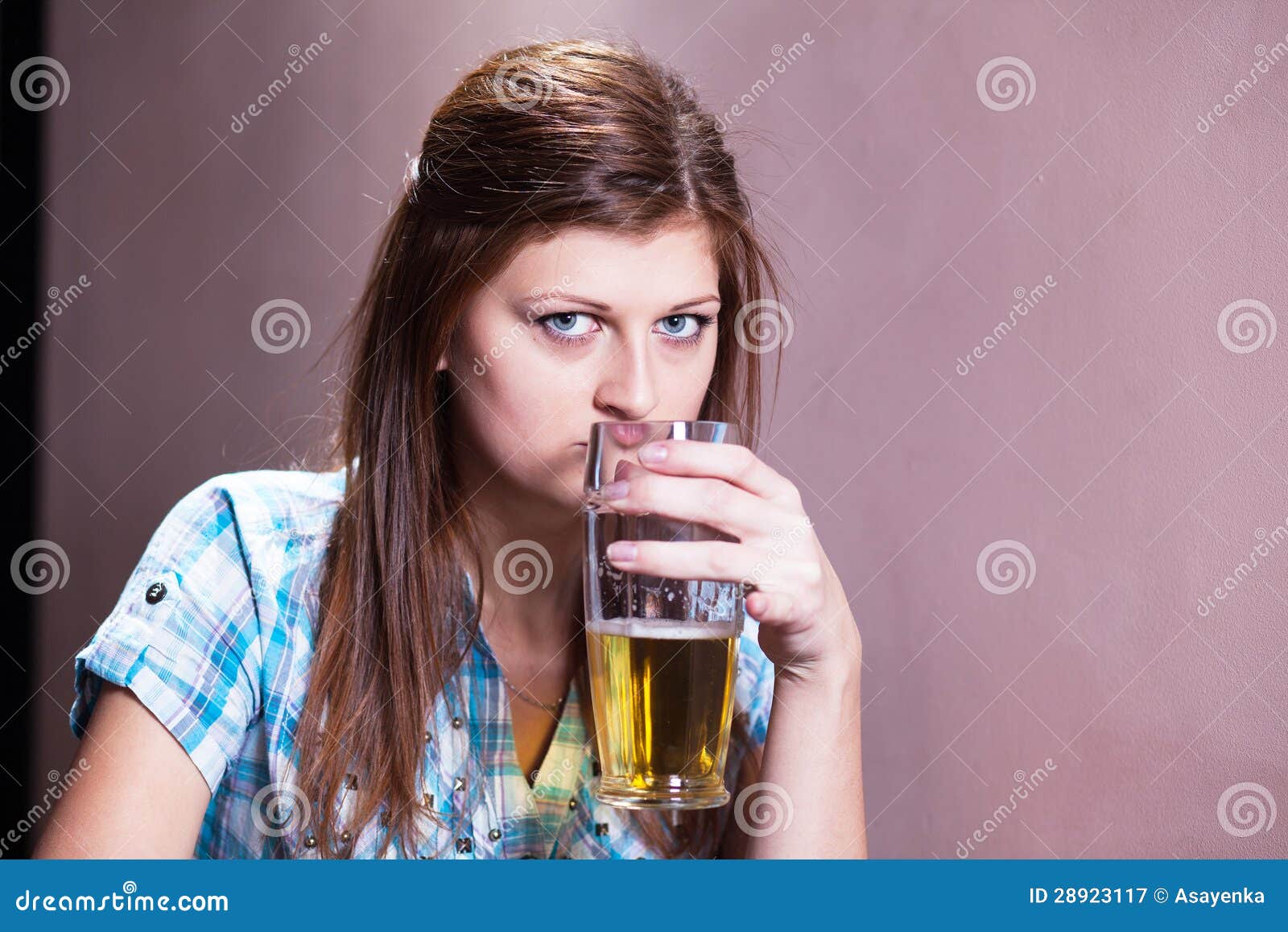 Young woman drinking lager stock image. Image of anatomy - 28923117