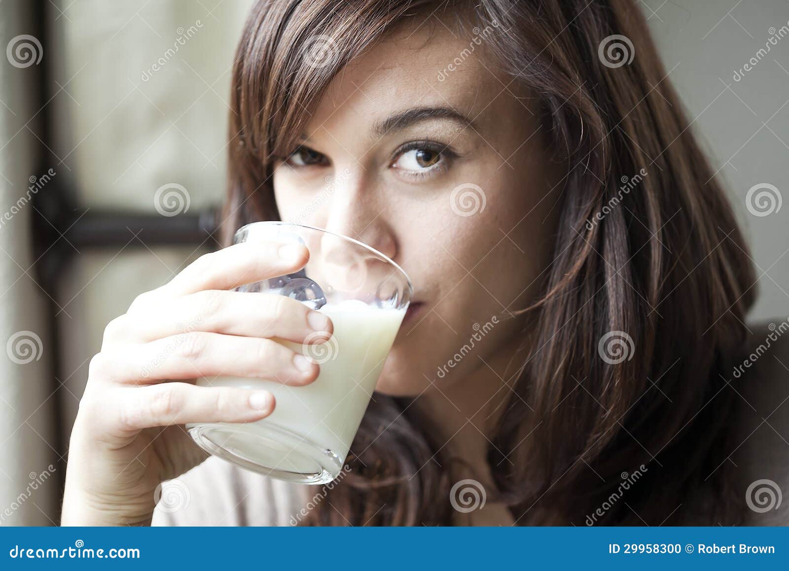 Young Woman Drinking Milk stock photo. Image of blue - 29958300