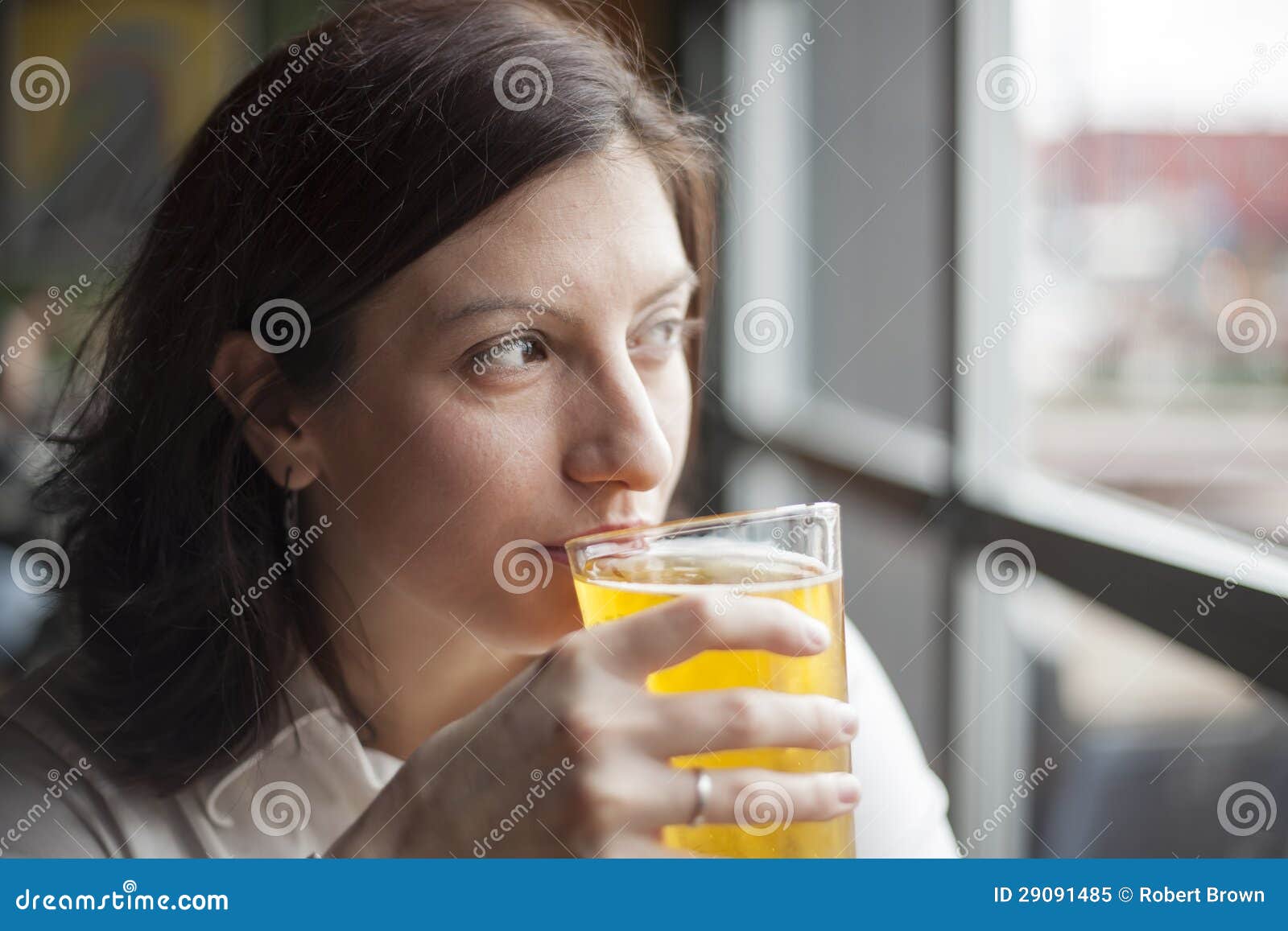 Young Woman Drinking a Pint of Hard Cider Stock Image - Image of ...