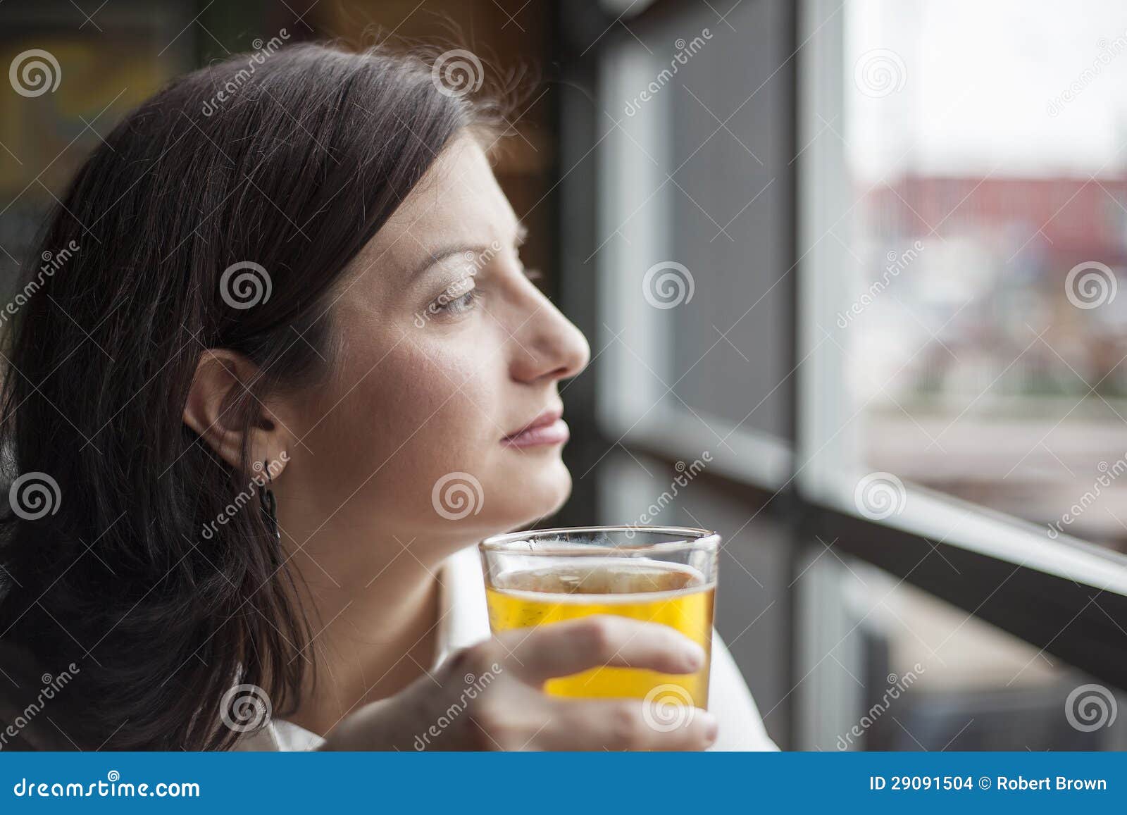 Young Woman Drinking a Pint of Hard Cider Stock Photo - Image of ...
