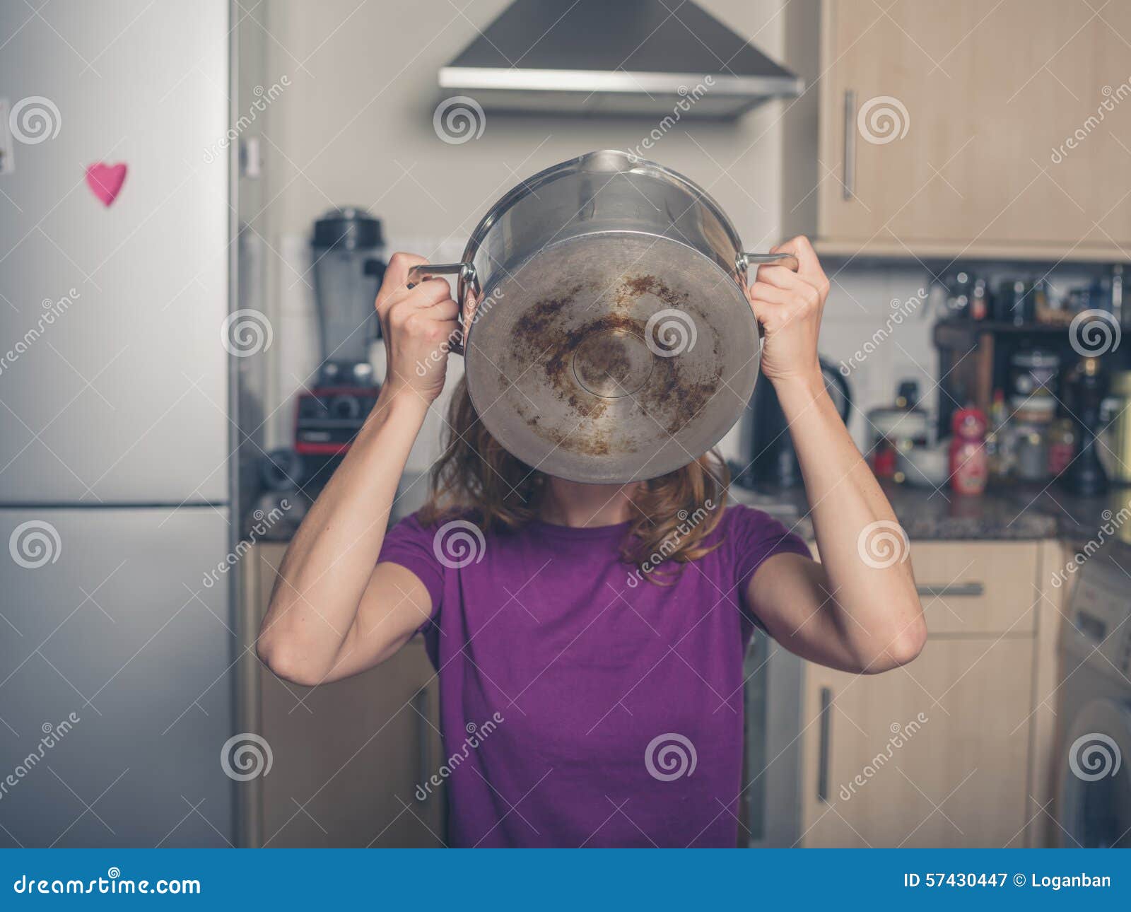 Young Woman Drinking from Pot in Kitchen Stock Image - Image of ...