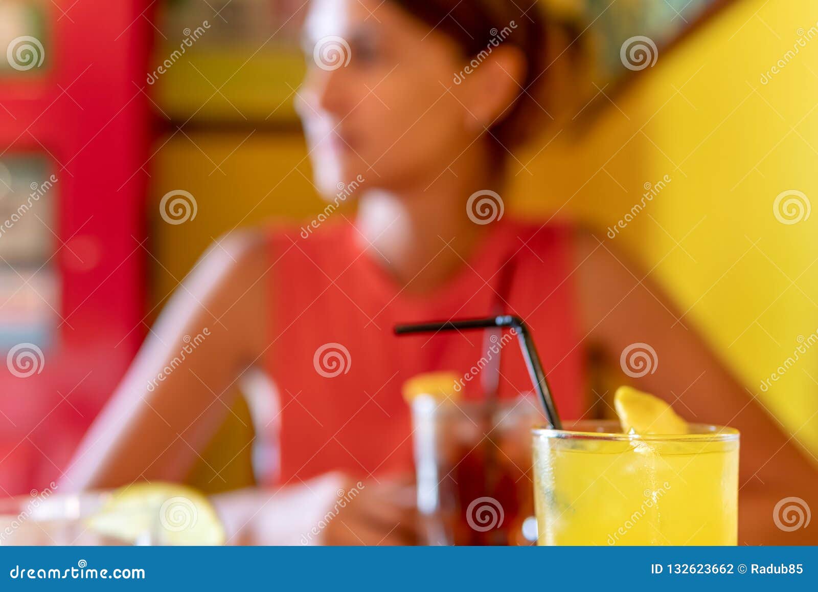 Young Woman Drinking Refreshments at Restaurant Stock Photo - Image of ...