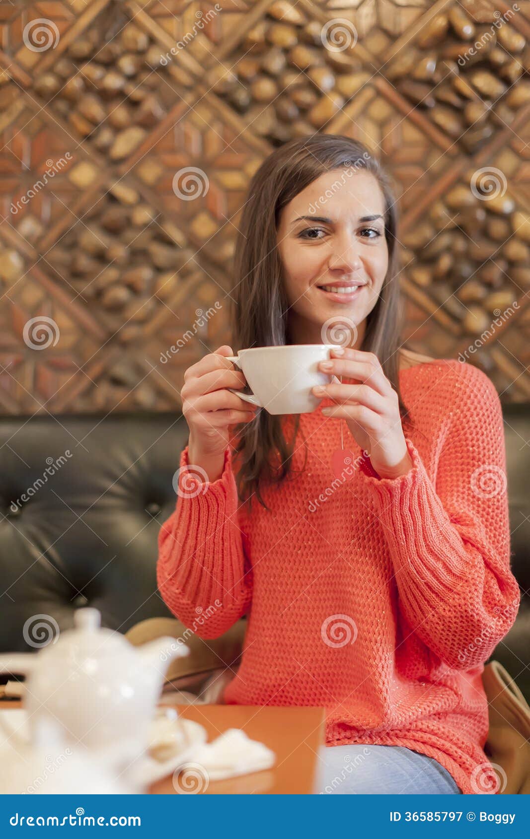 Young woman drinking tea stock image. Image of person - 36585797