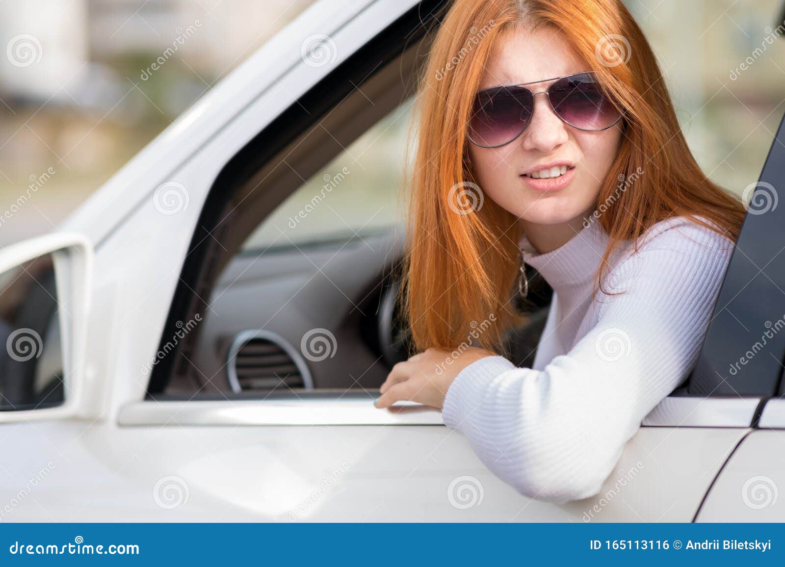 Young Woman Driver Looking Out of a Car Window Stock Photo - Image of ...