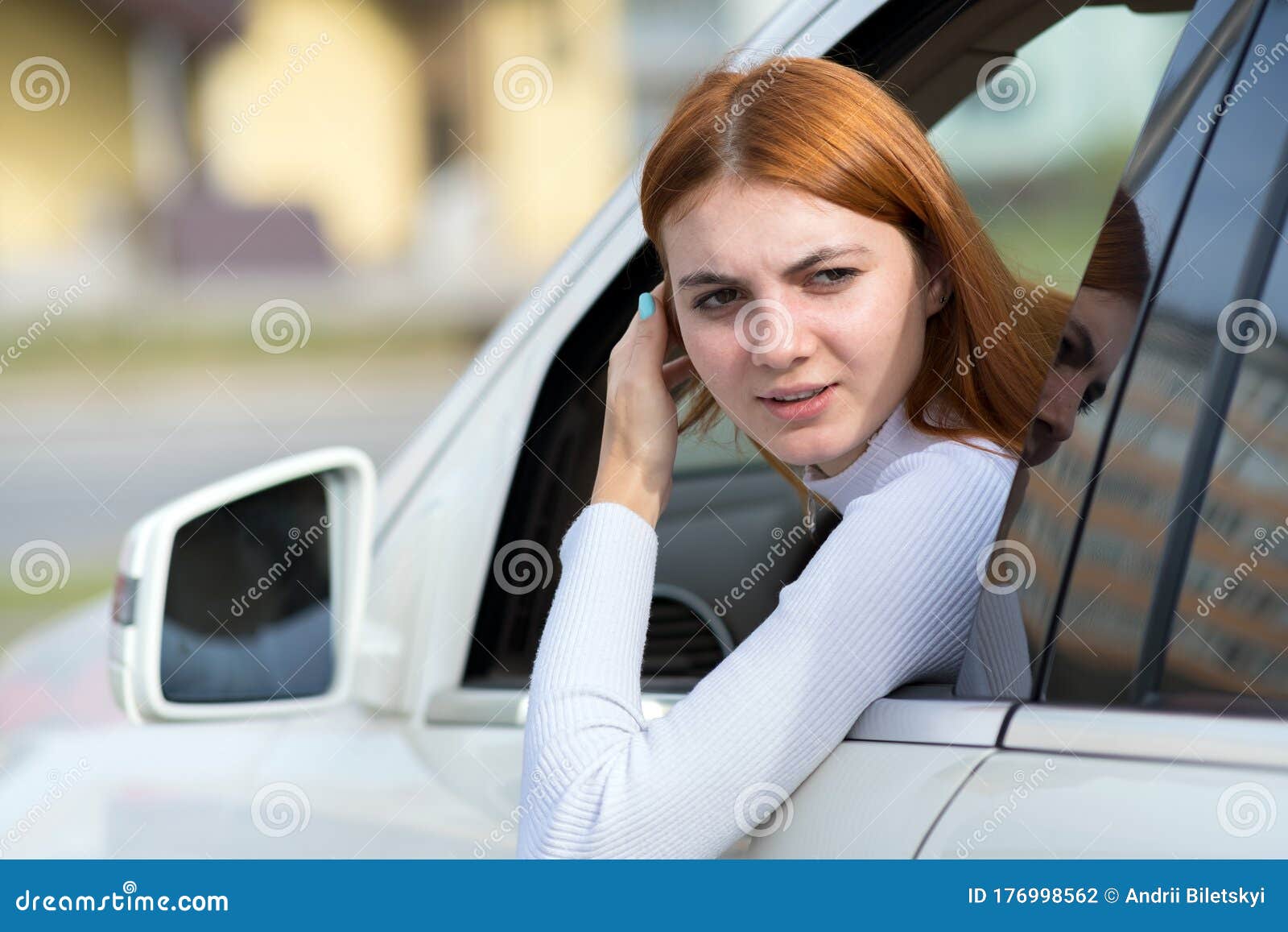 Young Woman Driver Looking Out of a Car Window Stock Photo - Image of ...
