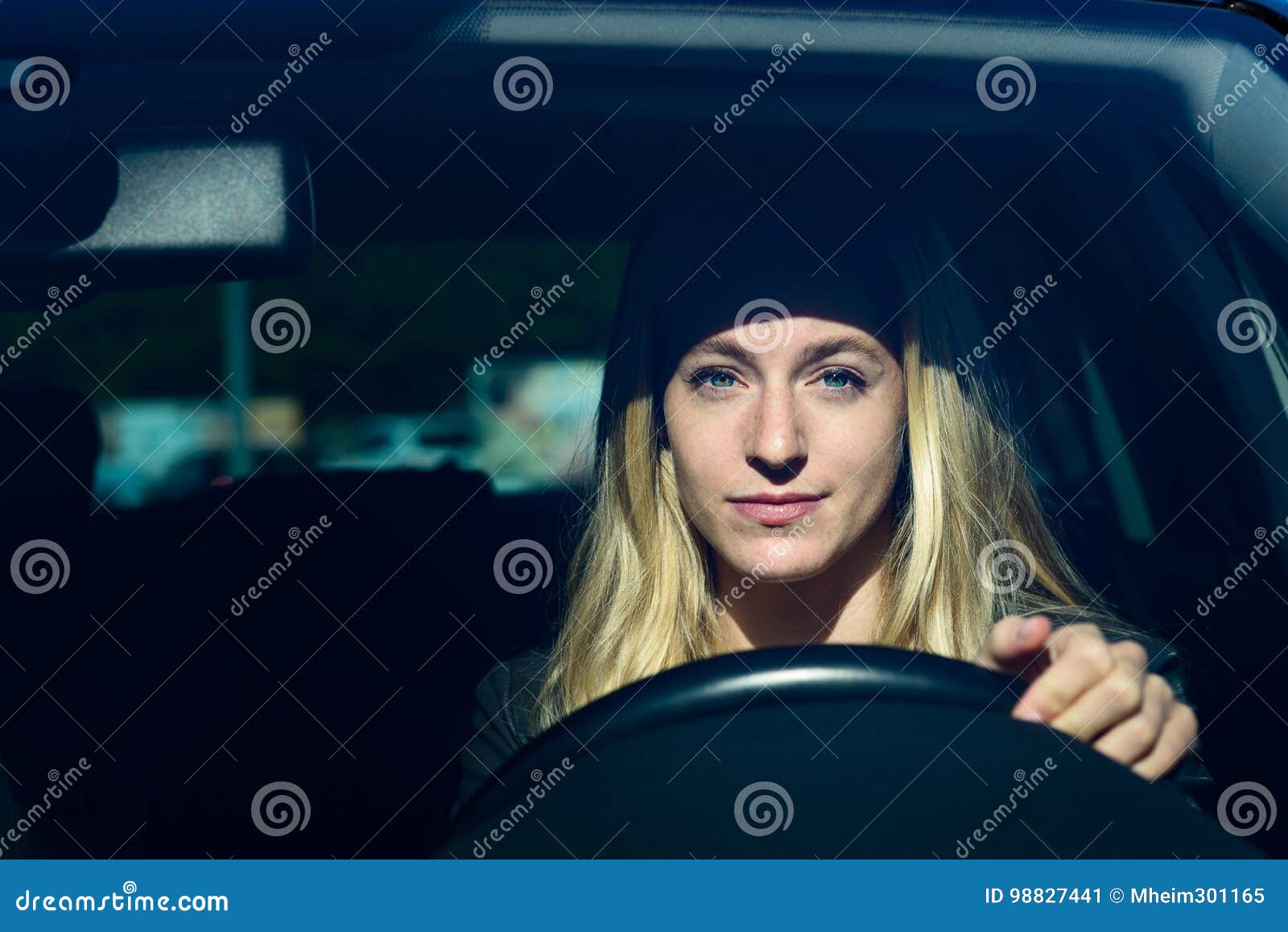 Young woman driving a car stock image. Image of window - 98827441