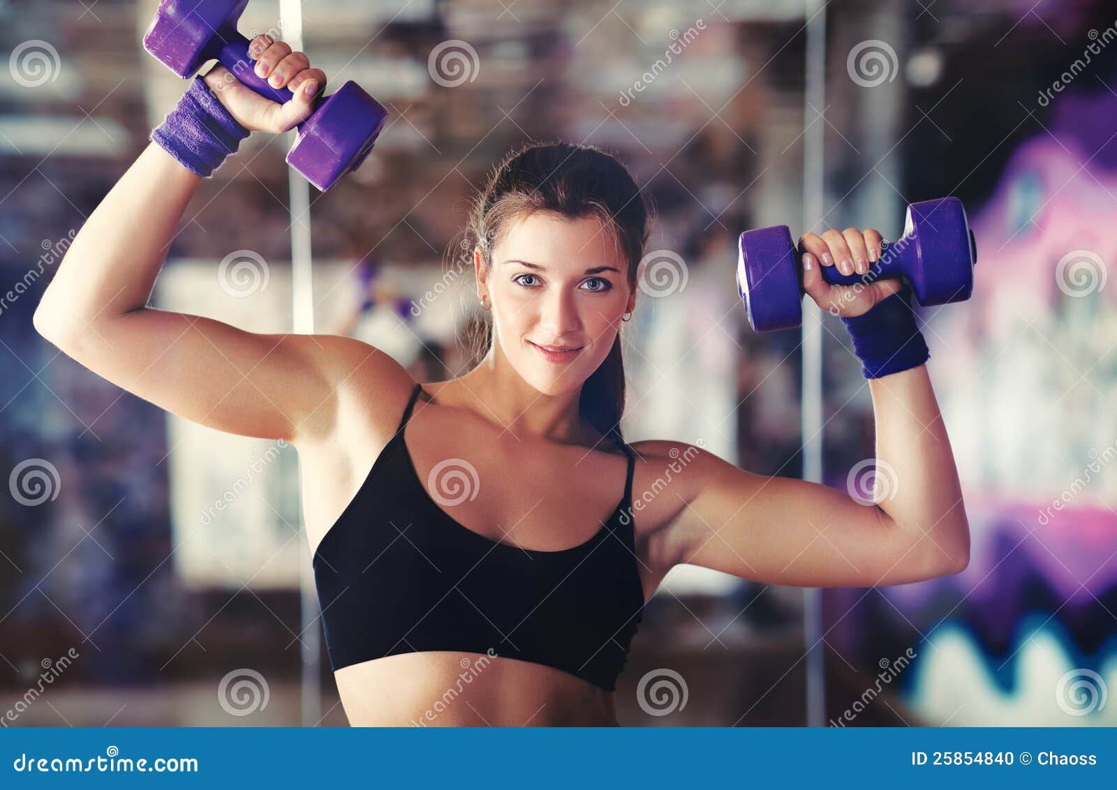 Young woman with dumbbells stock photo. Image of beautiful - 25854840