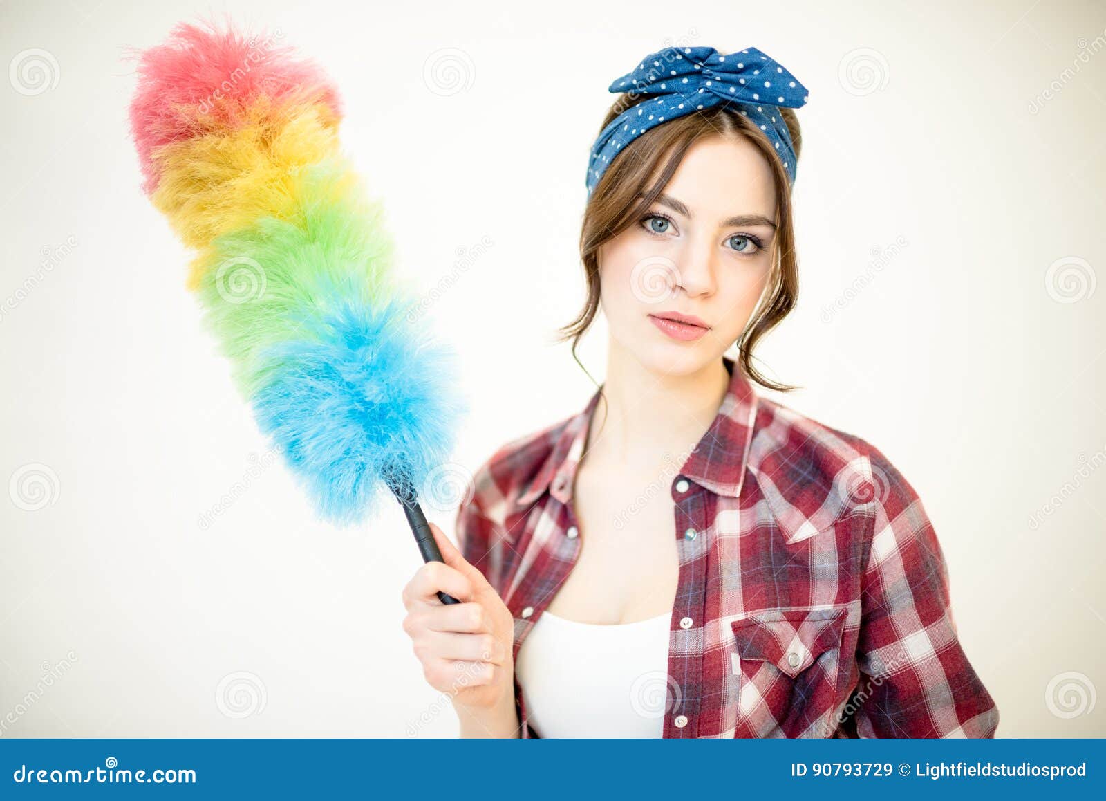 Young woman with duster stock image. Image of duster - 90793729