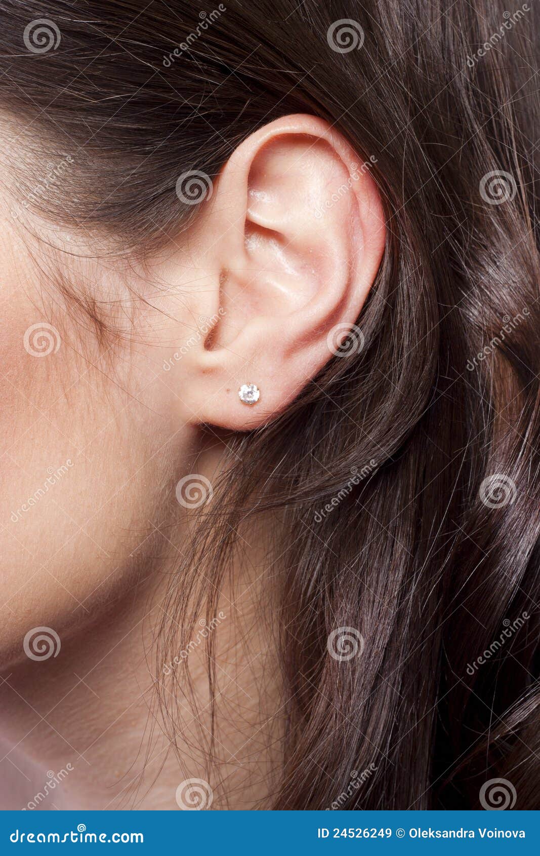 Young woman ear closeup stock image. Image of earlobe - 24526249