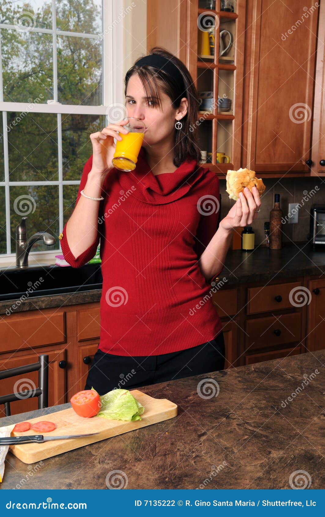 Young Woman Eating stock photo. Image of businesswoman - 7135222