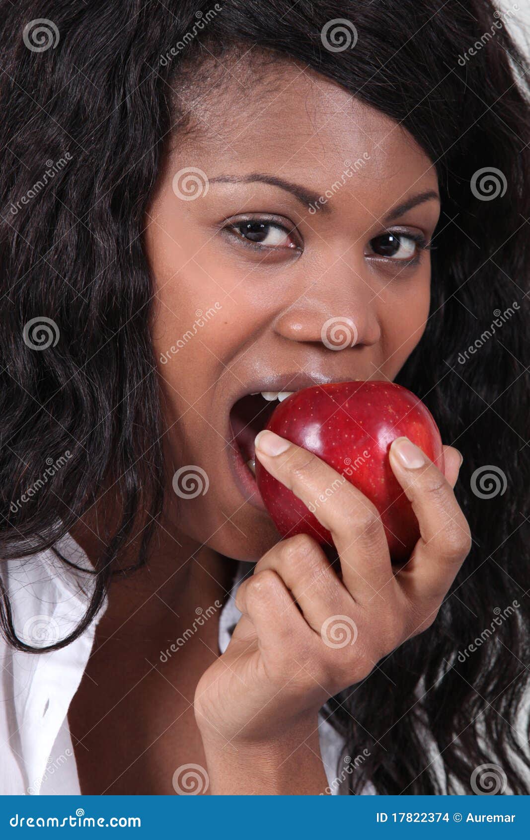 Young Woman Eating an Apple Stock Photo - Image of curly, long: 17822374