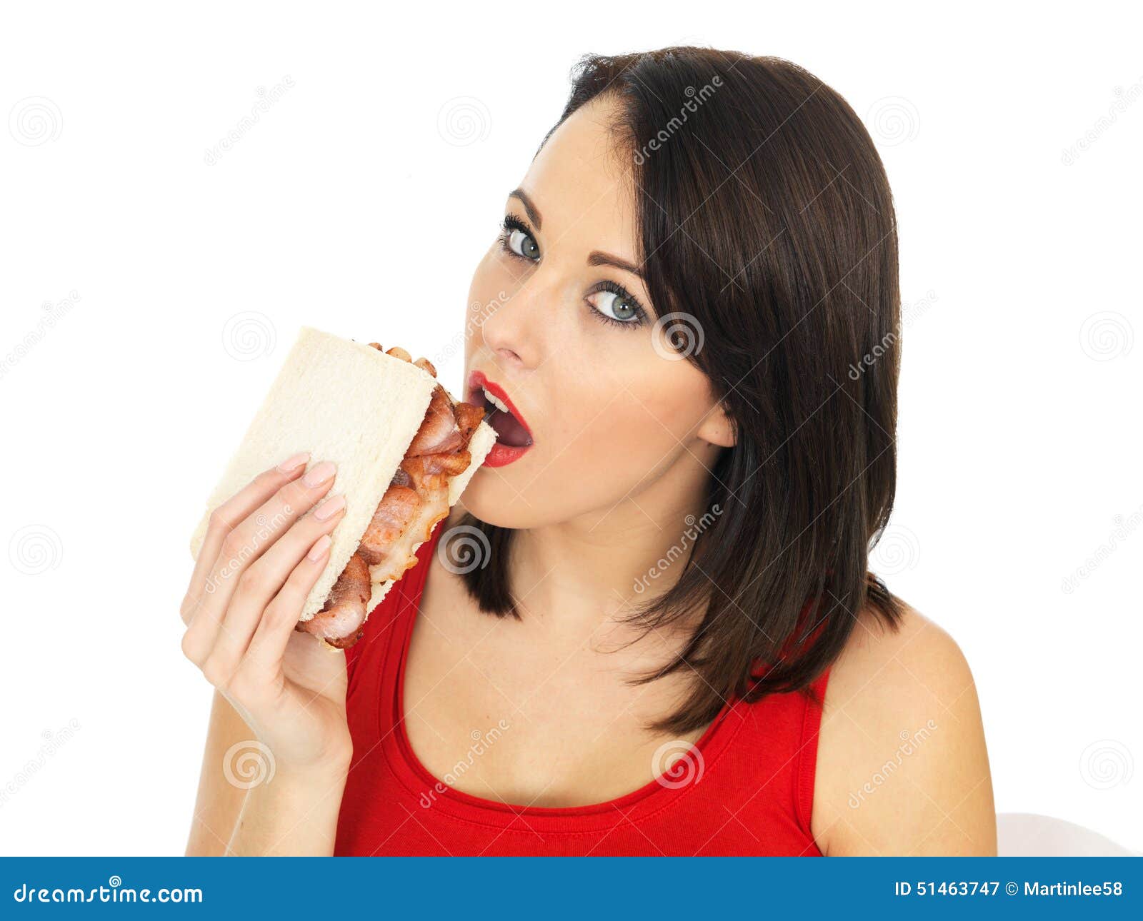 Young Woman Eating a Bacon Sandwich Stock Image - Image of isolated ...