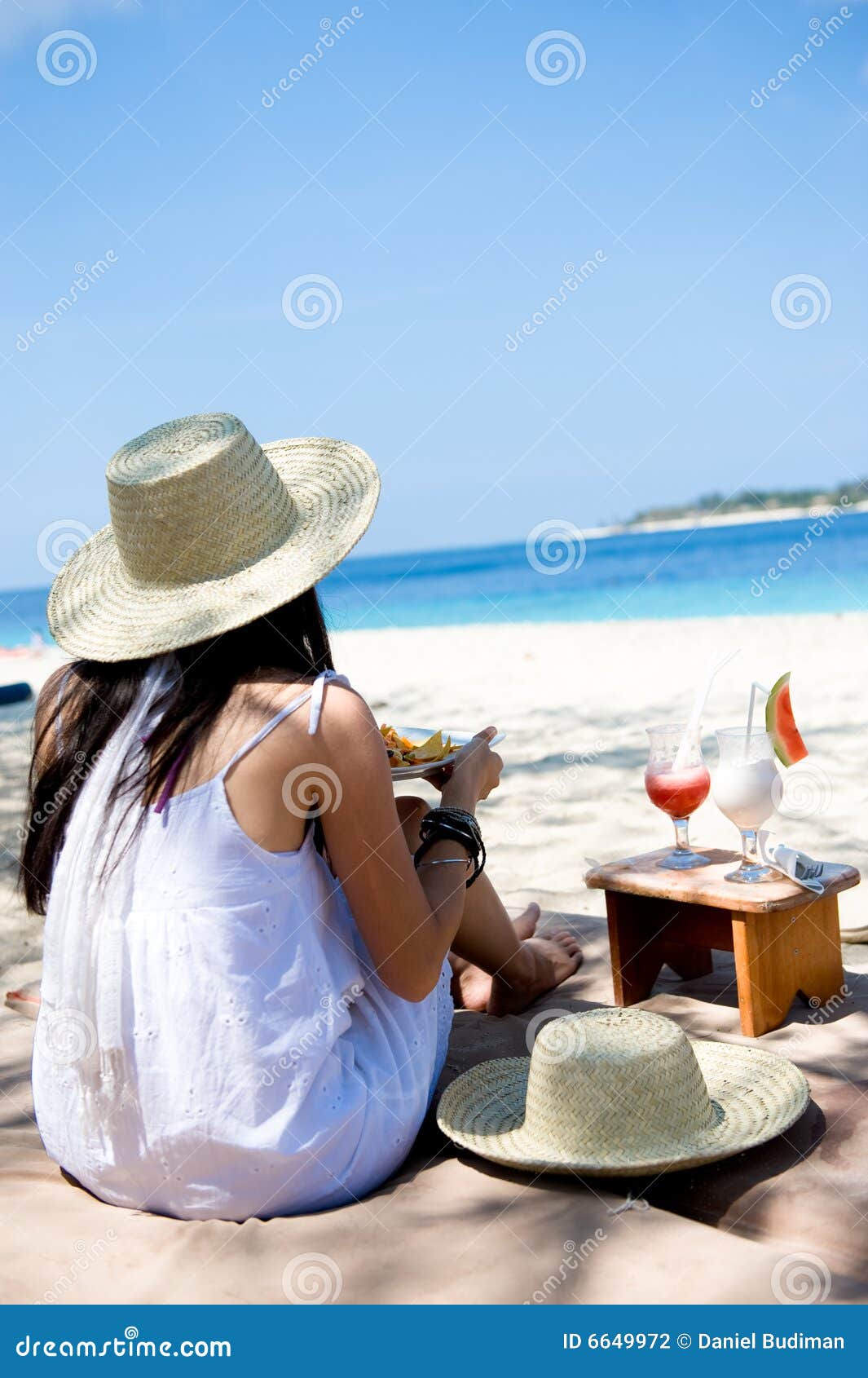 Young Woman Eating on the Beach Stock Photo - Image of cute, good: 6649972