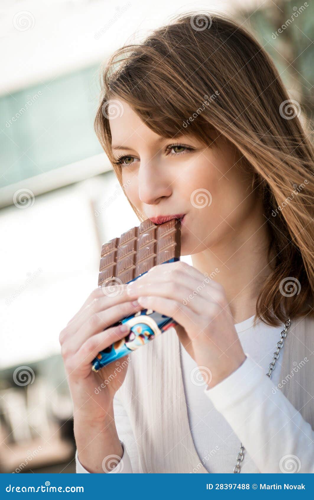 Young Woman Eating Chocolate Stock Photo - Image of people, lifestyle ...