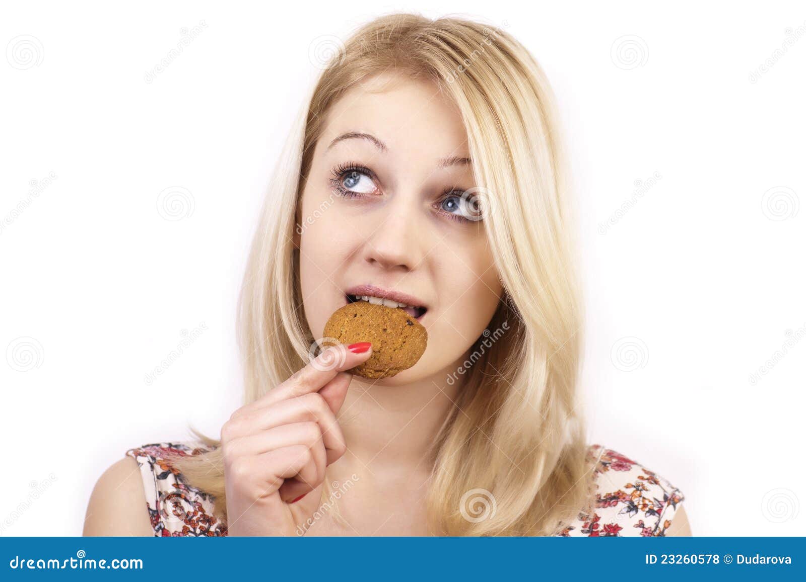 Young woman eating cookie stock photo. Image of hungry - 23260578