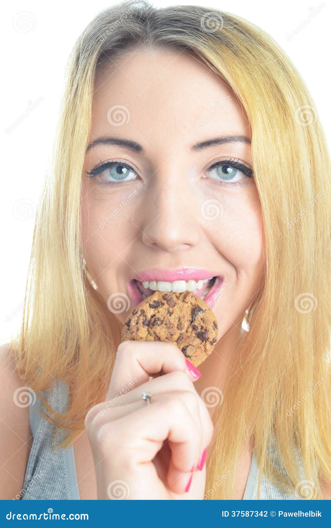 Young woman eating cookie stock photo. Image of fast - 37587342
