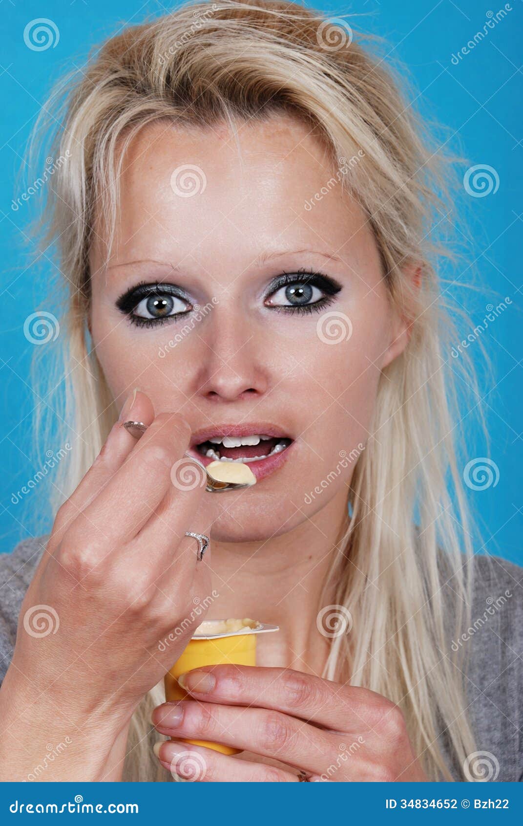 Young woman eating cream stock photo. Image of appetite - 34834652
