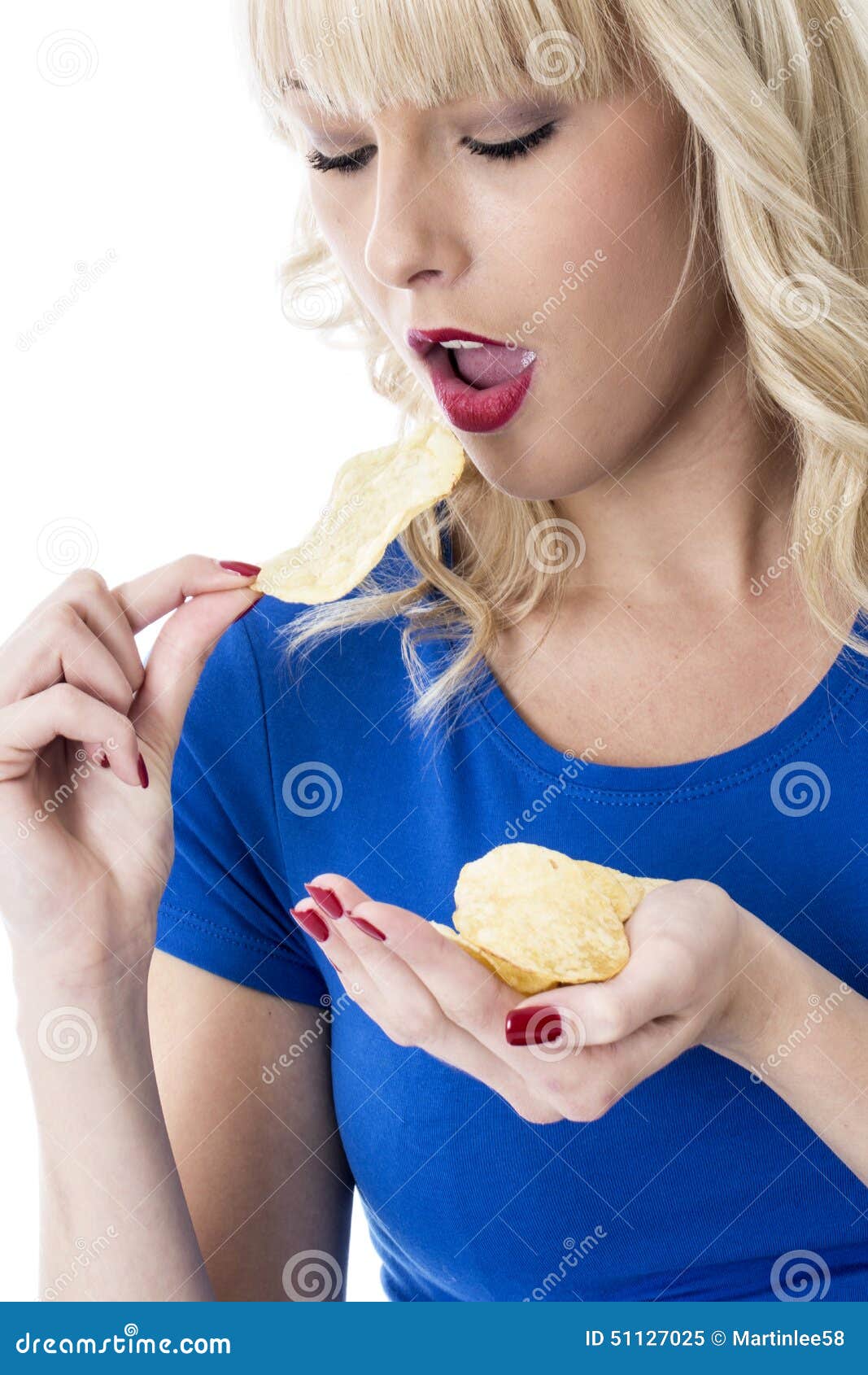 Young Woman Eating Crisps stock image. Image of crisps - 51127025