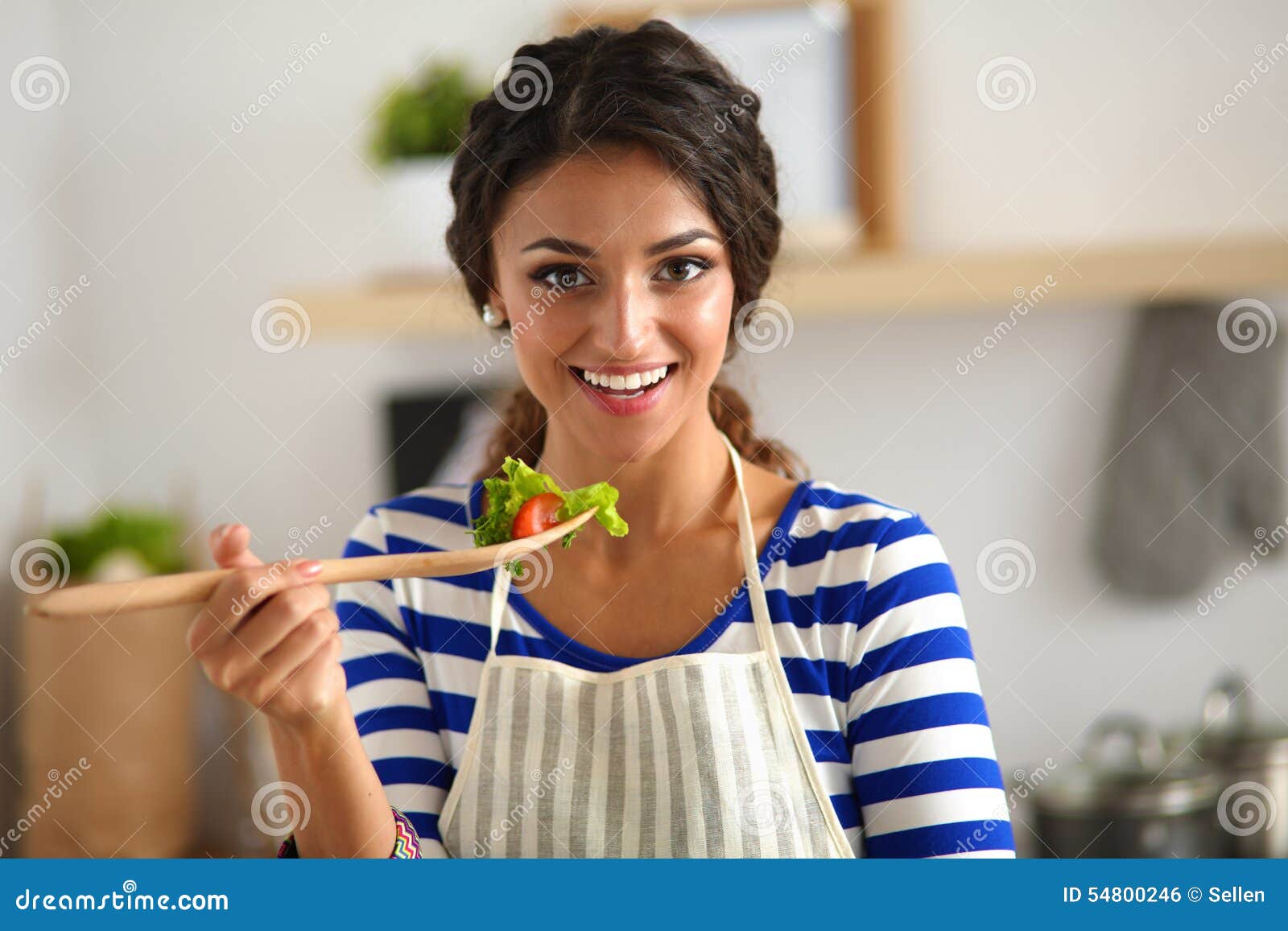 Young Woman Eating Fresh Salad in Modern Kitchen Stock Photo - Image of ...