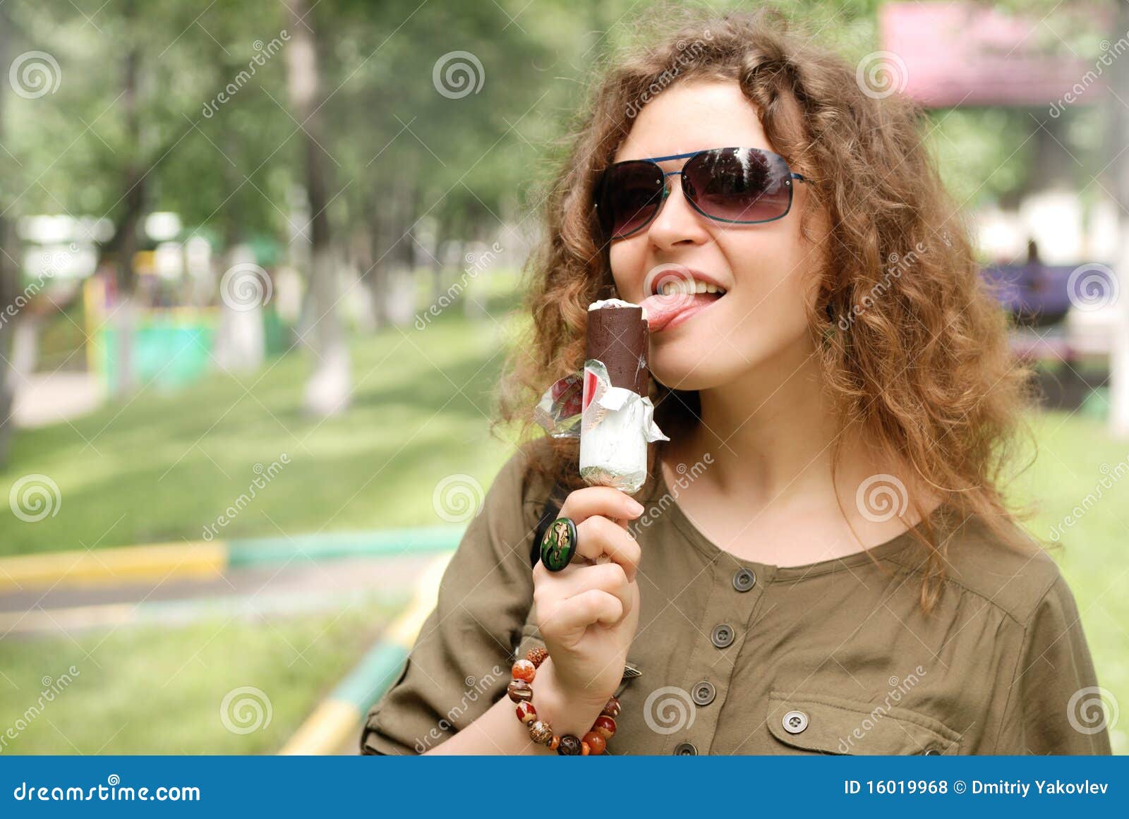Young Woman Eating Ice-cream Stock Photo - Image of eating, background ...