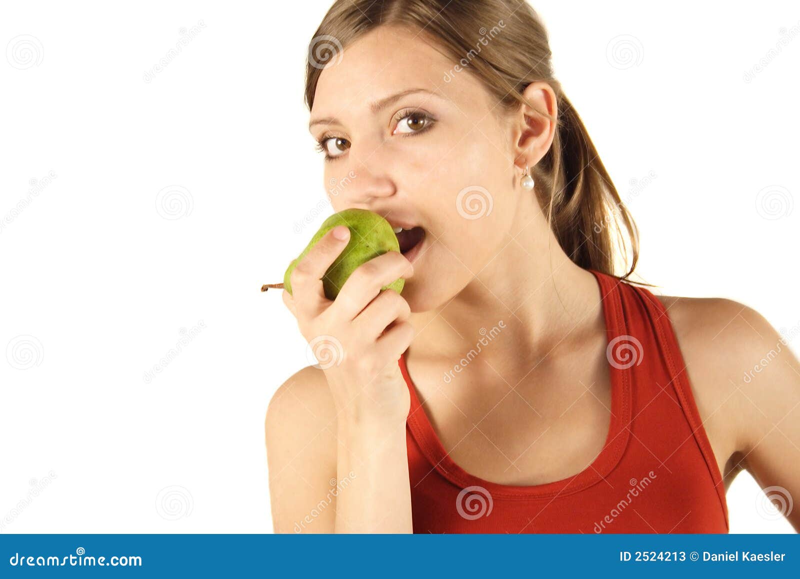 Young woman eating pear stock image. Image of bite, food - 2524213