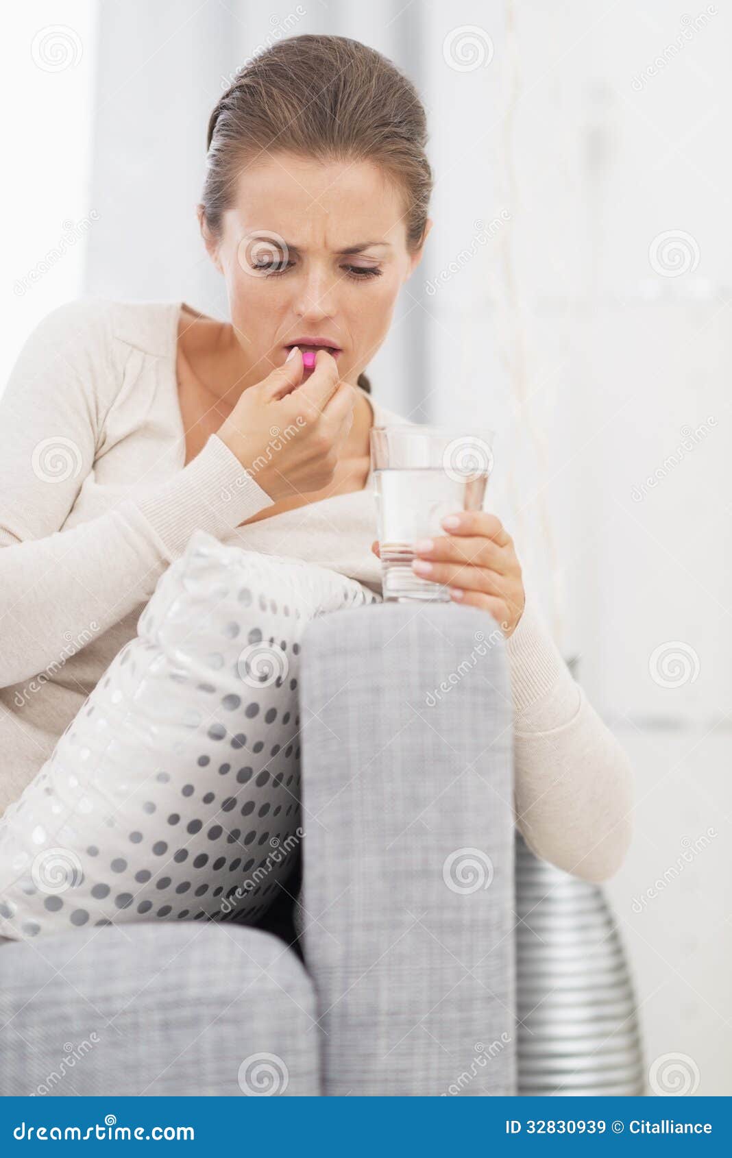 Young woman eating pill stock image. Image of beautiful - 32830939