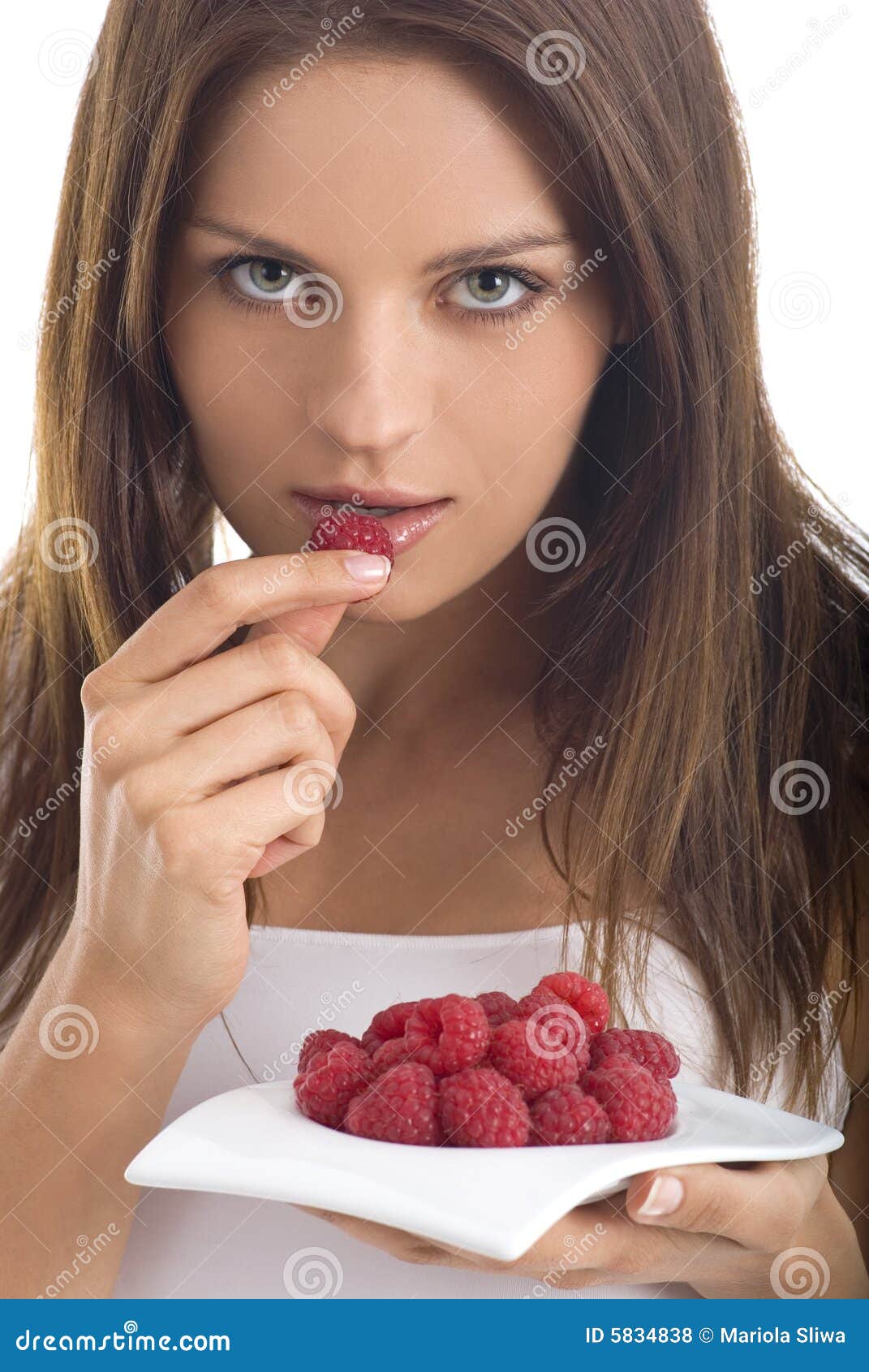 Young Woman Eating Raspberry Stock Photo - Image of girl, juicy: 5834838