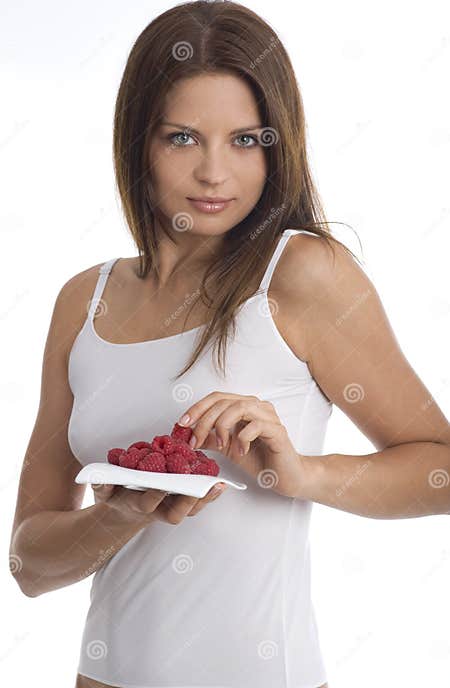 Young Woman Eating Raspberry Stock Image - Image of beauty, nature: 5834853