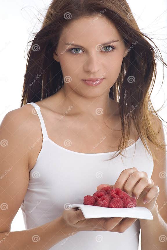 Young Woman Eating Raspberry Stock Photo - Image of beauty, adult: 5834906