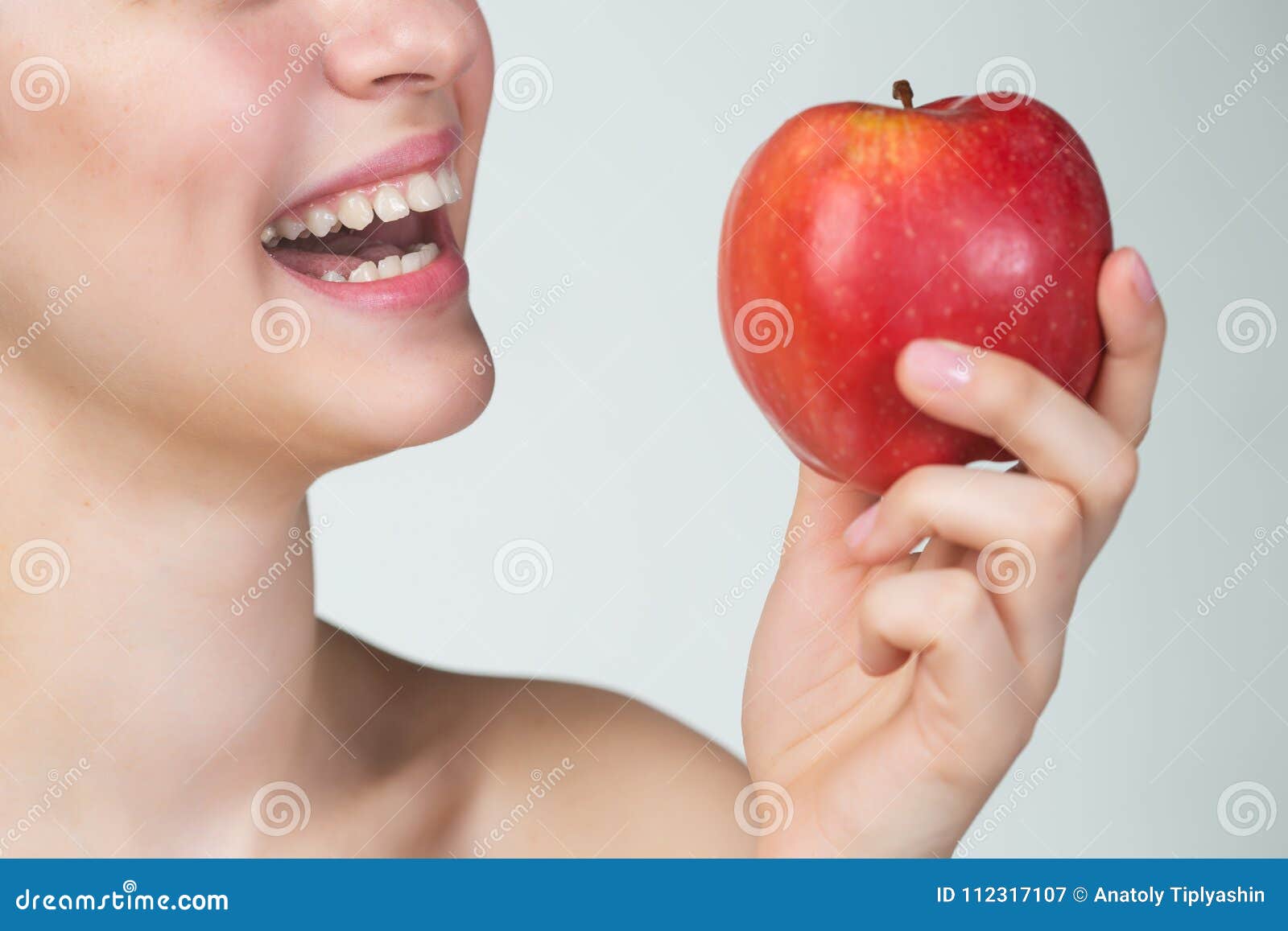 Young Woman Eating Red Apple Stock Image - Image of perfect, apple ...