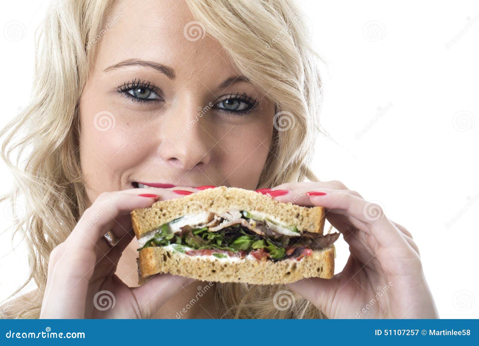 Young Woman Eating a Sandwich Stock Image - Image of hair, enjoying ...