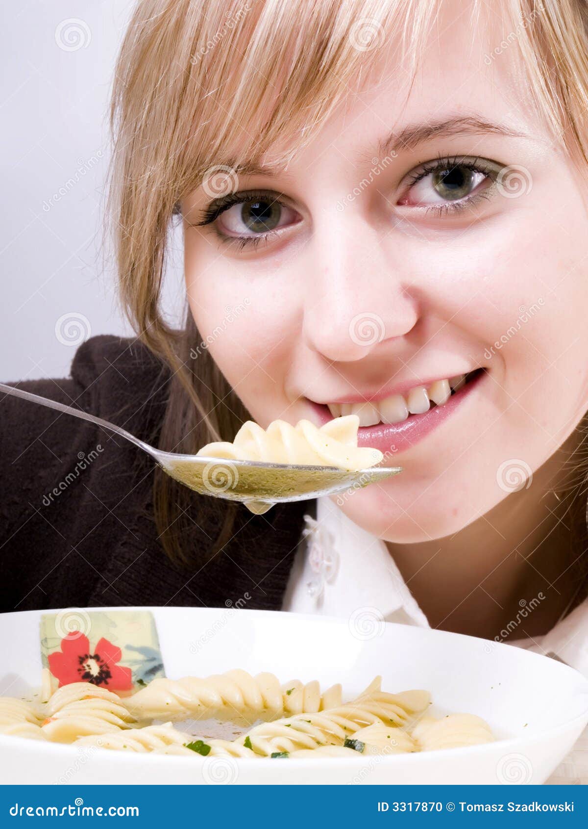 Young woman eating soup stock photo. Image of yummy, blond - 3317870