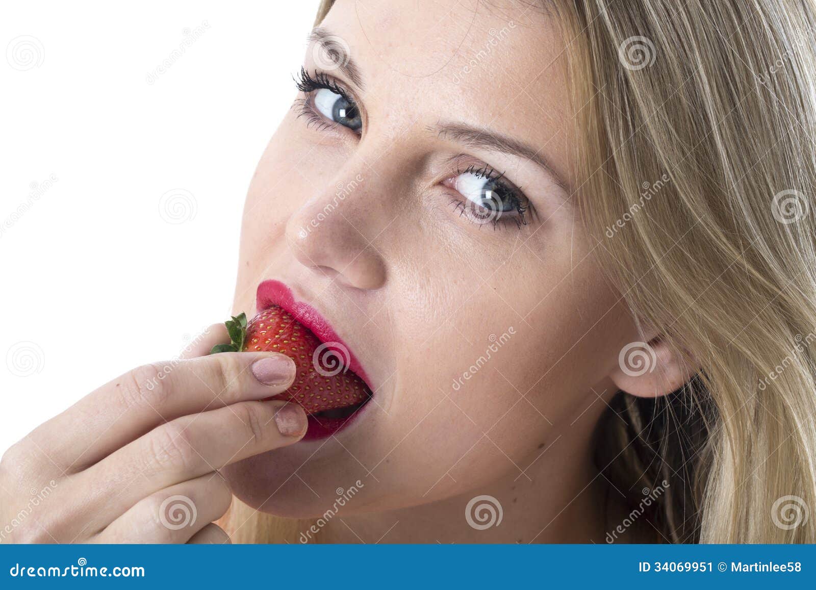 Young Woman Eating a Strawberry Stock Image - Image of twenties ...
