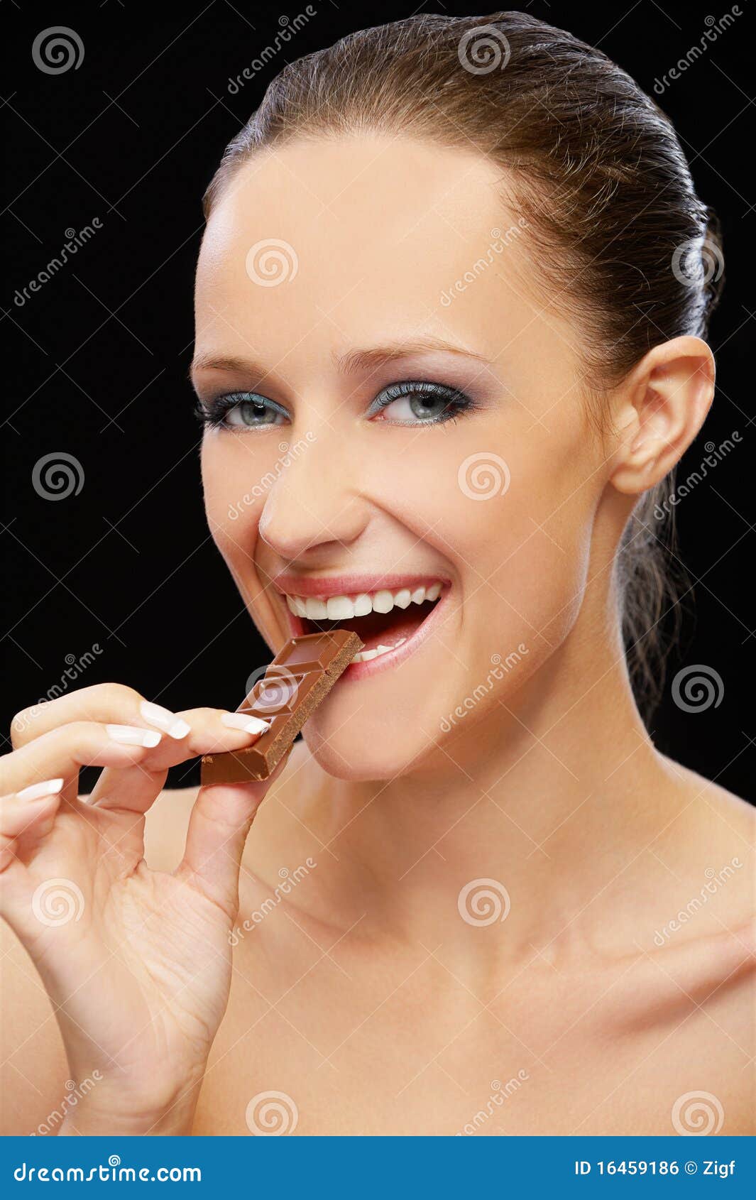 Young woman eating sweets stock photo. Image of brown - 16459186