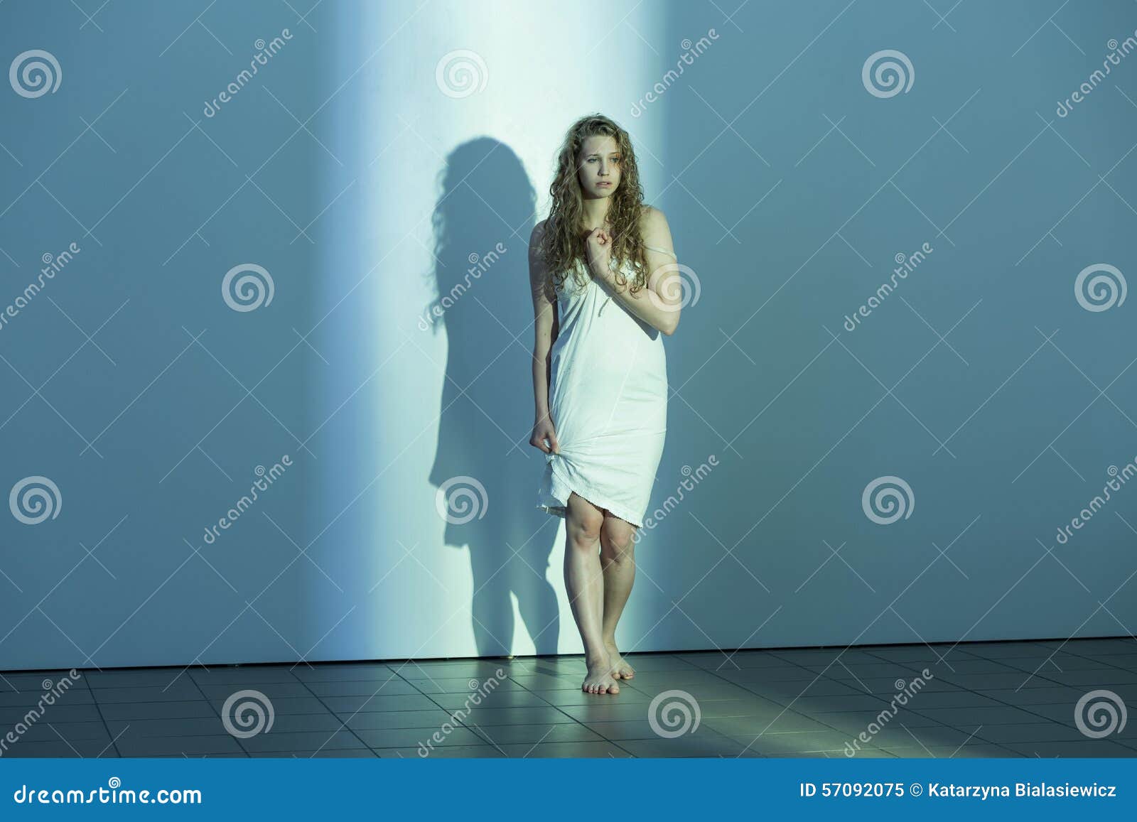 Young woman in empty room stock image. Image of innocence - 57092075