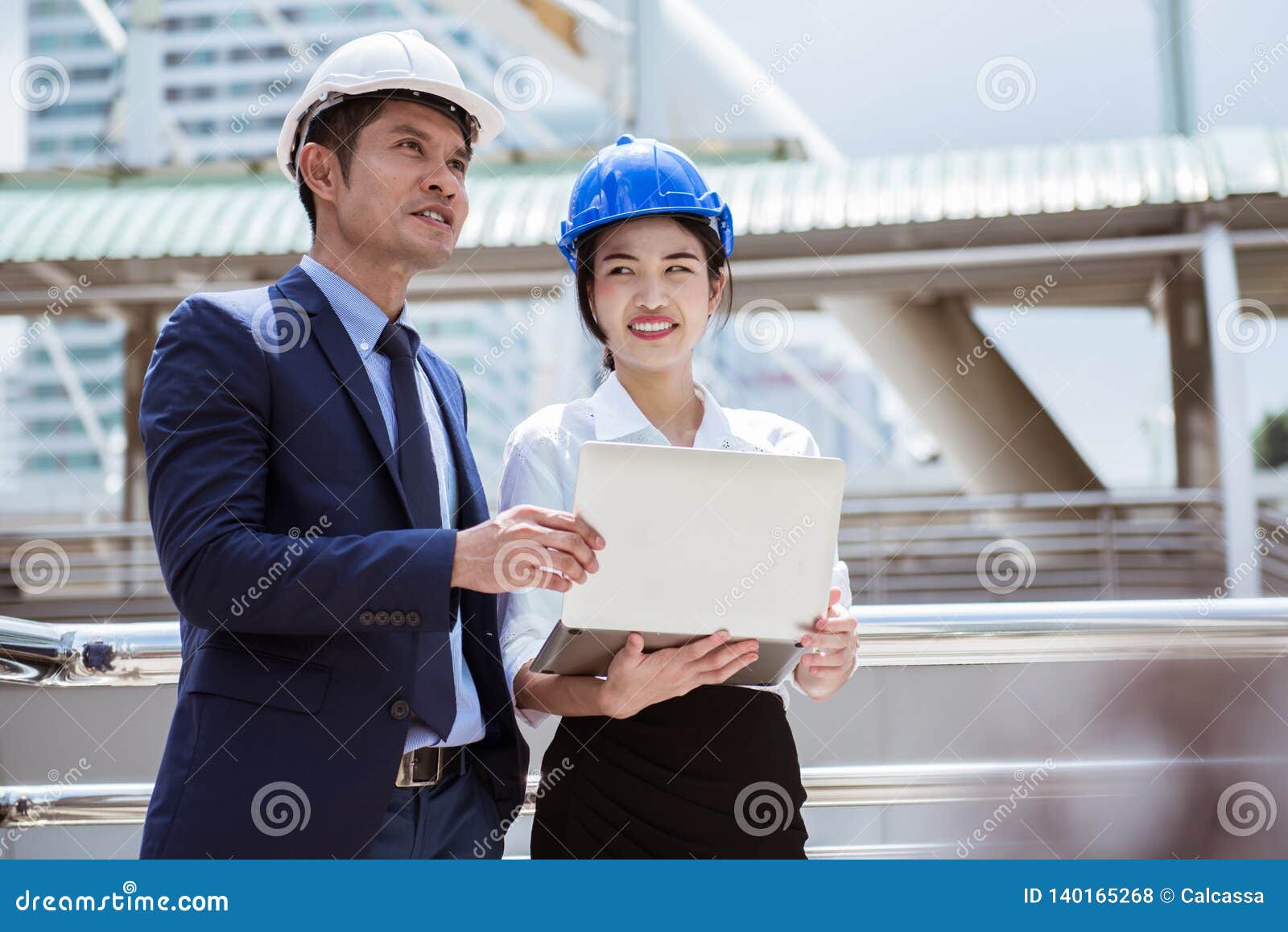 Young Woman Engineer Discussed Project with Her Client Stock Photo ...