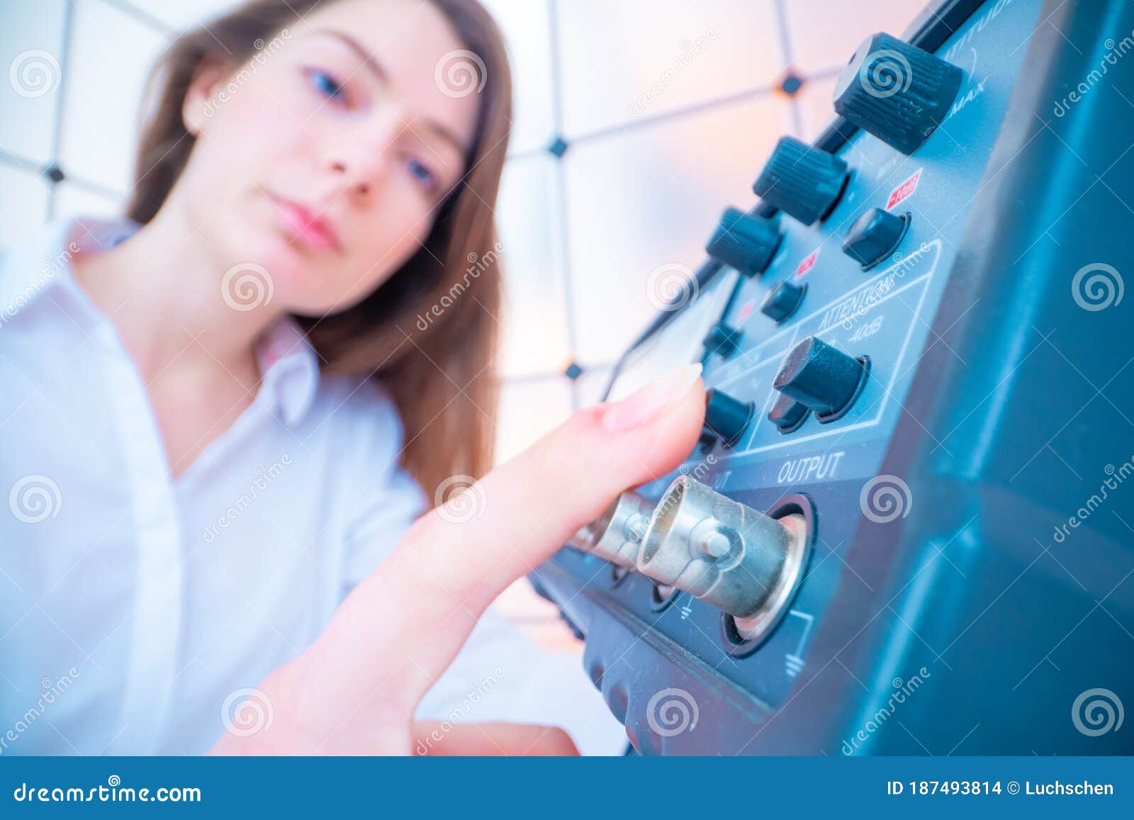 Young Woman Engineer Work with Measuring Devices in the Electronics ...