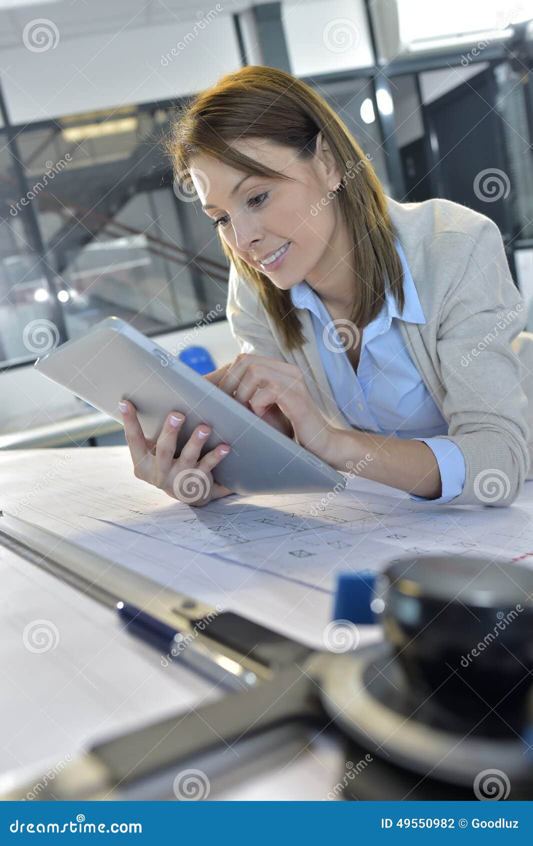 Young Woman Engineer Workin at the Office Using a Tablet Stock Photo ...